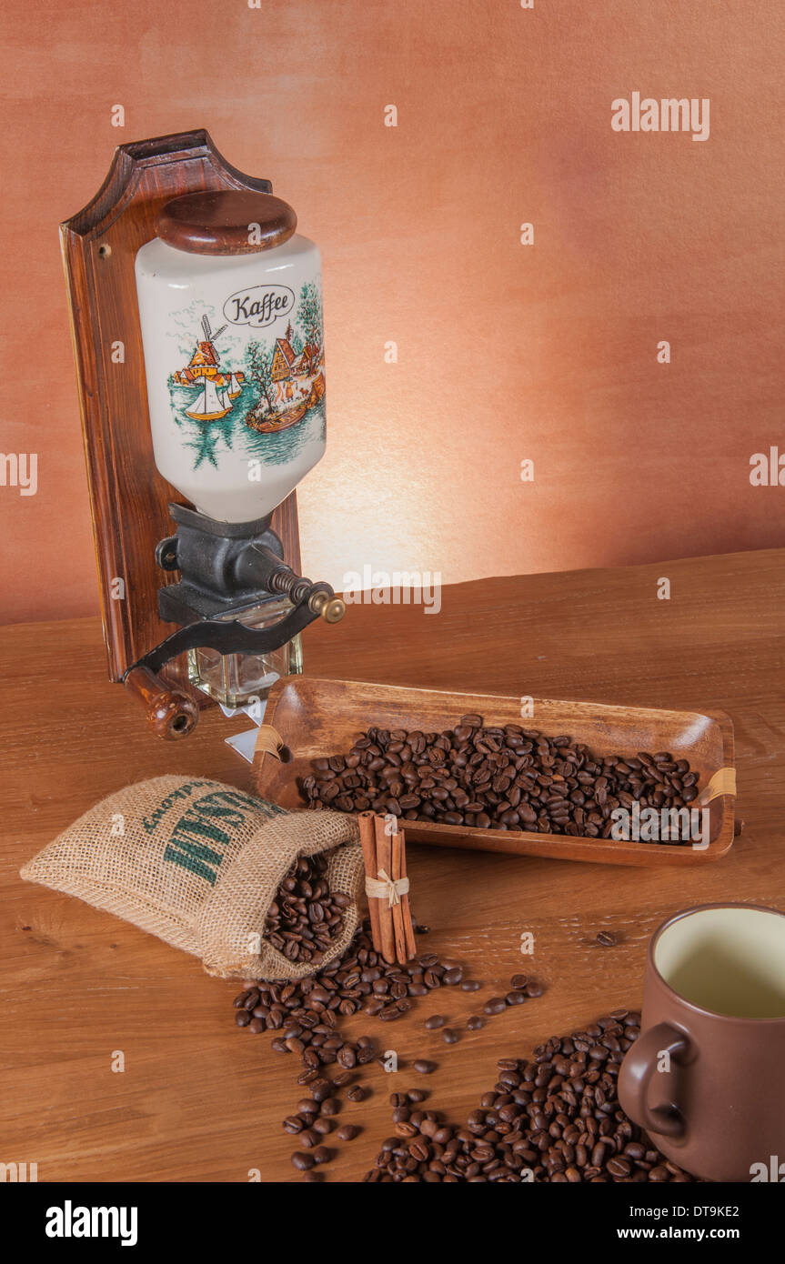 Coffee theme with wooden table and dark background Stock Photo - Alamy