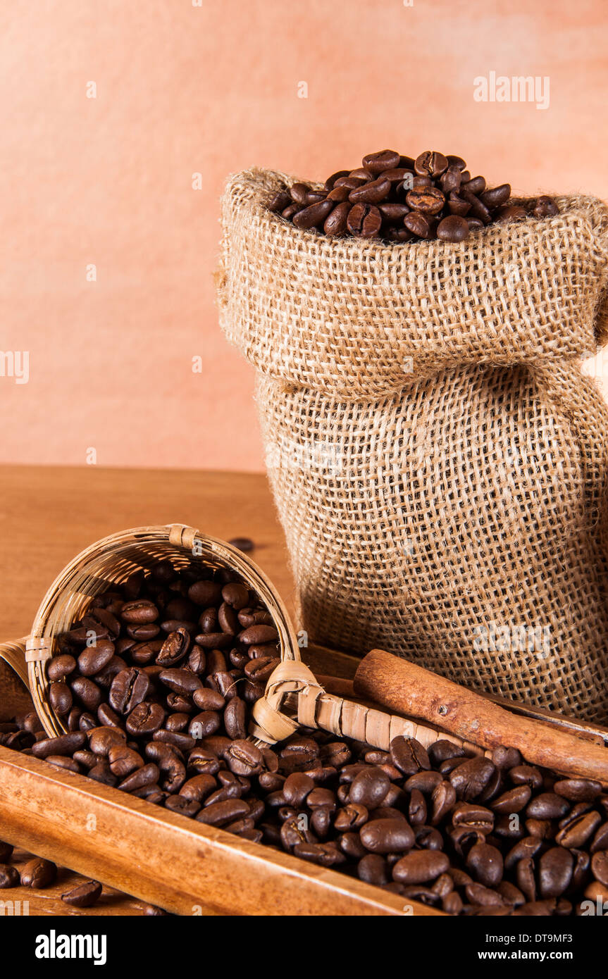 Coffee theme with wooden table and dark background Stock Photo - Alamy