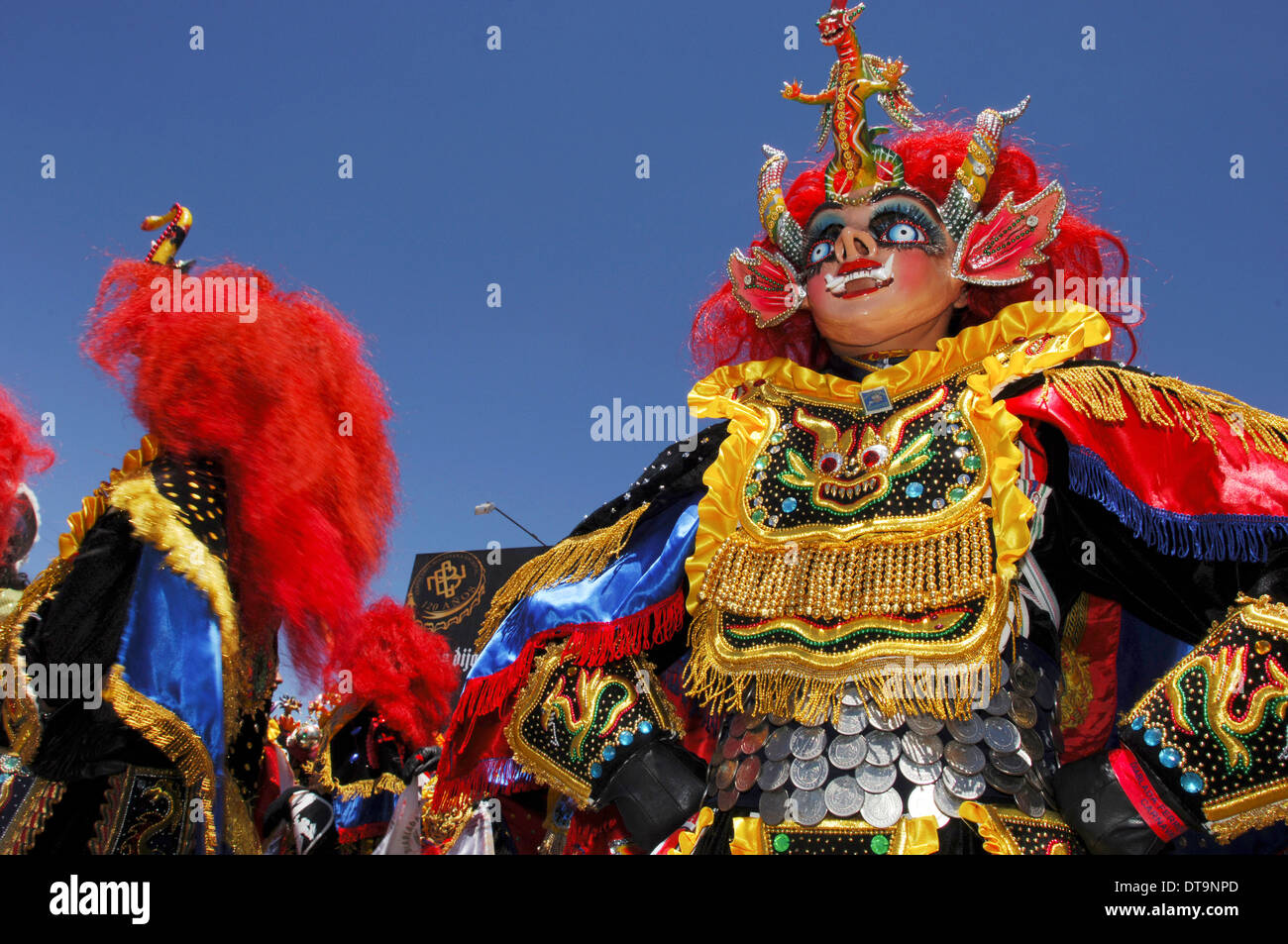 Participants diablada dancing, dance that represents fighting between ...