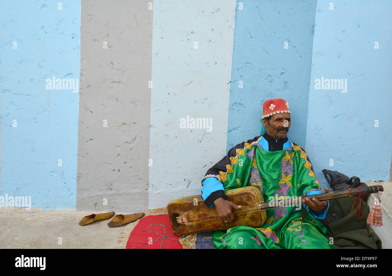 Gnawa musician with guembri, Kasbah of the Udayas (Qasbah des Oudaya ...