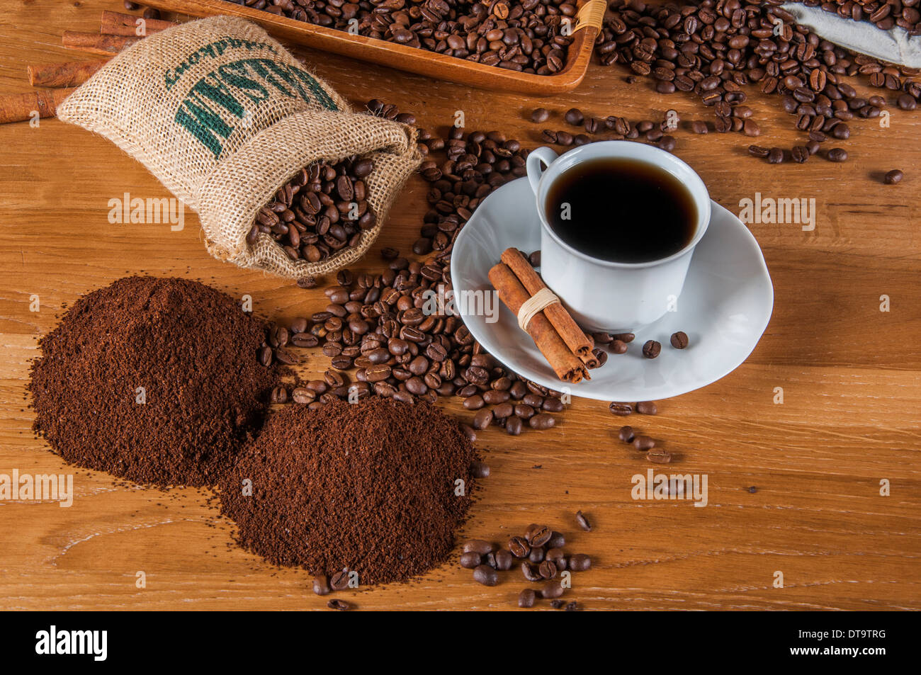 Coffee theme with wooden table and dark background Stock Photo - Alamy