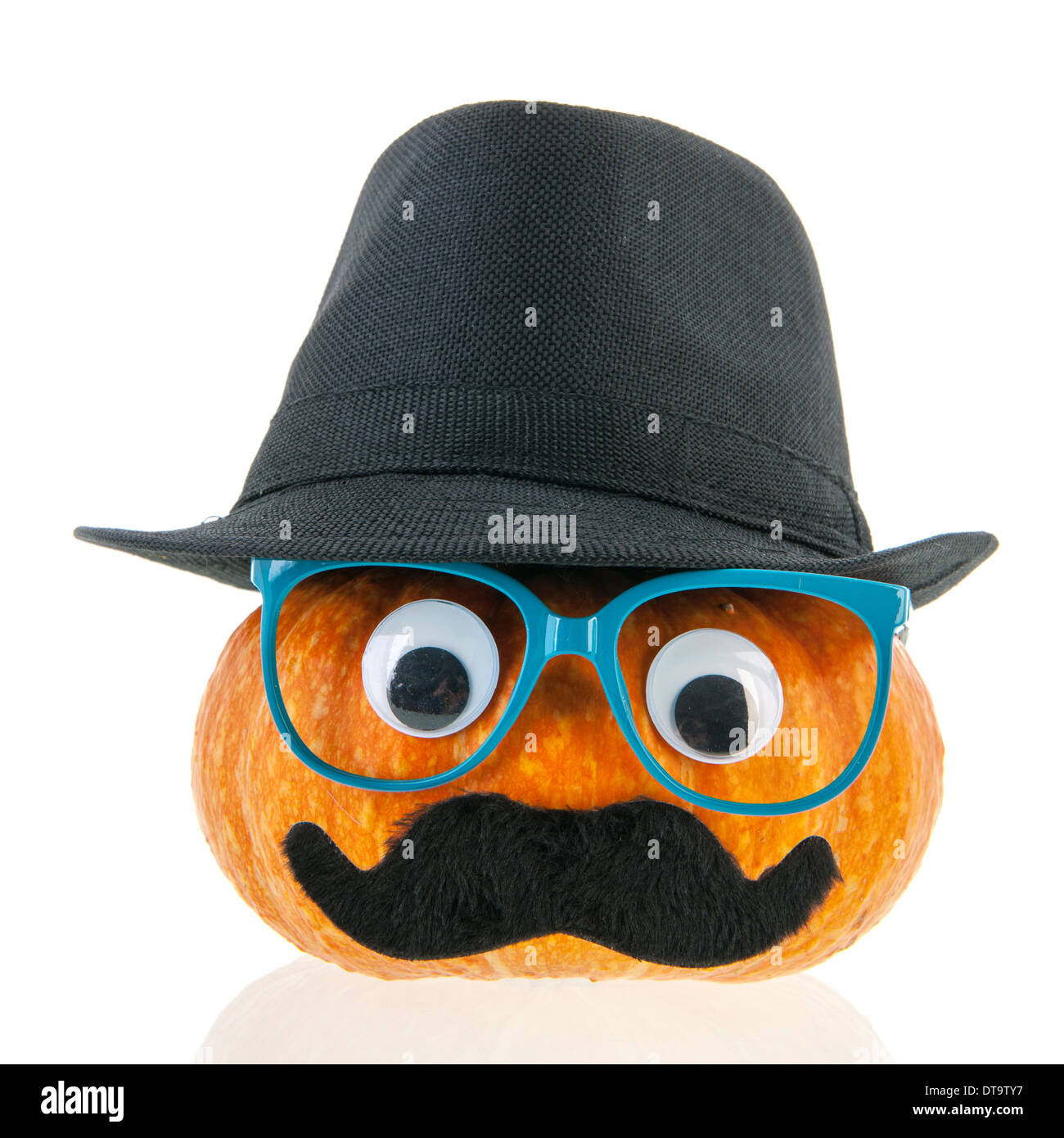 Funny pumpkin with eyes mustache and black hat isolated over white ...