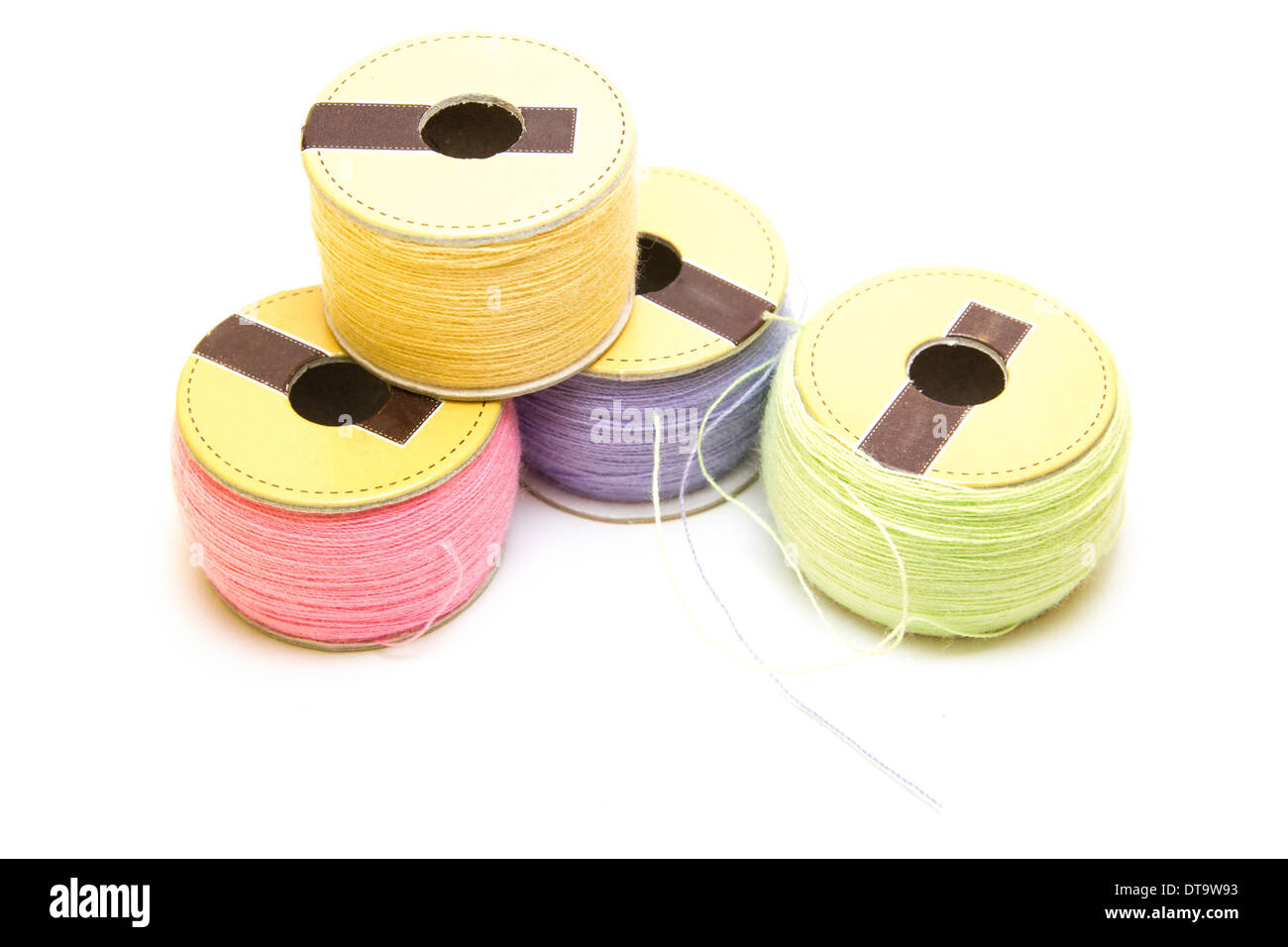 stack of coloured sewing thread Stock Photo - Alamy