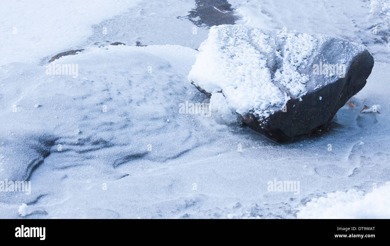 Rock covered in frost and ice Stock Photo - Alamy