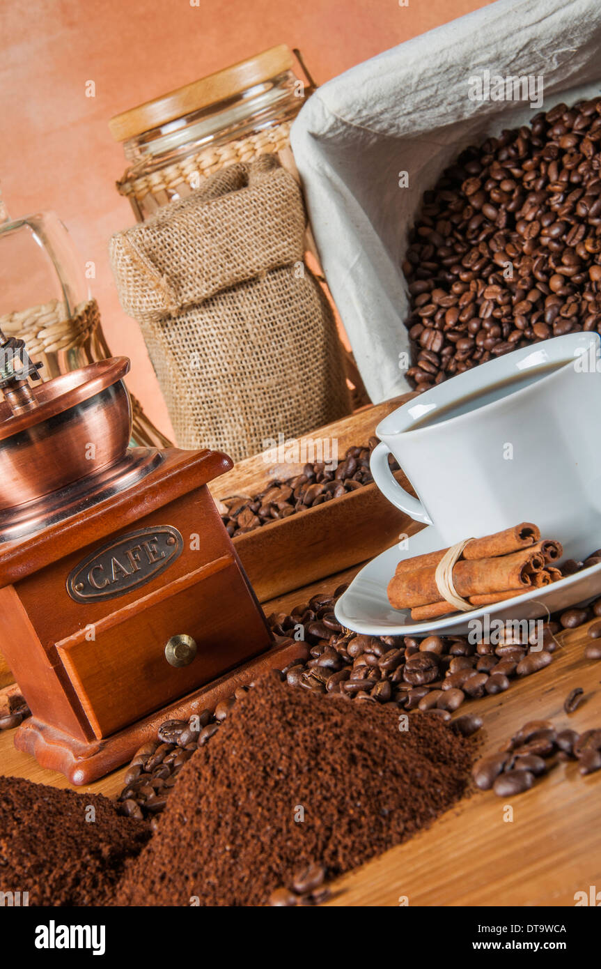 Coffee theme with wooden table and dark background Stock Photo - Alamy