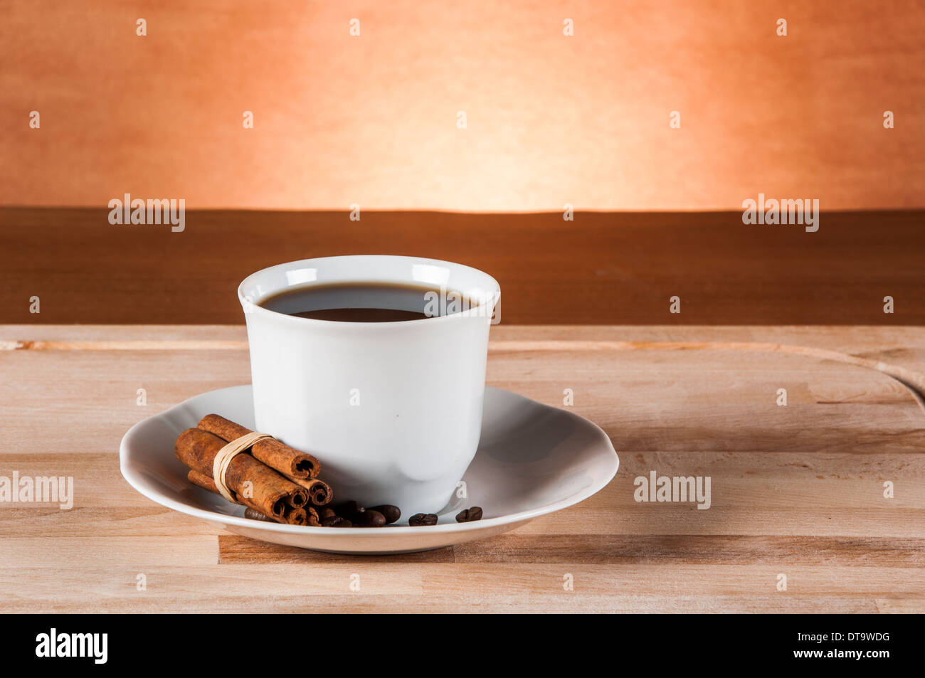 Coffee theme with wooden table and dark background Stock Photo - Alamy