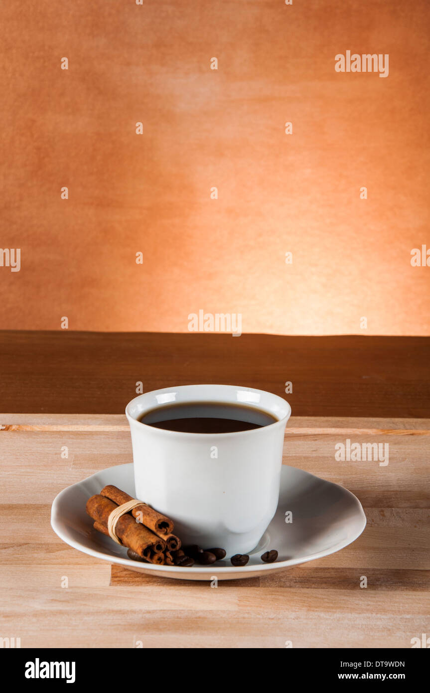Coffee theme with wooden table and dark background Stock Photo - Alamy