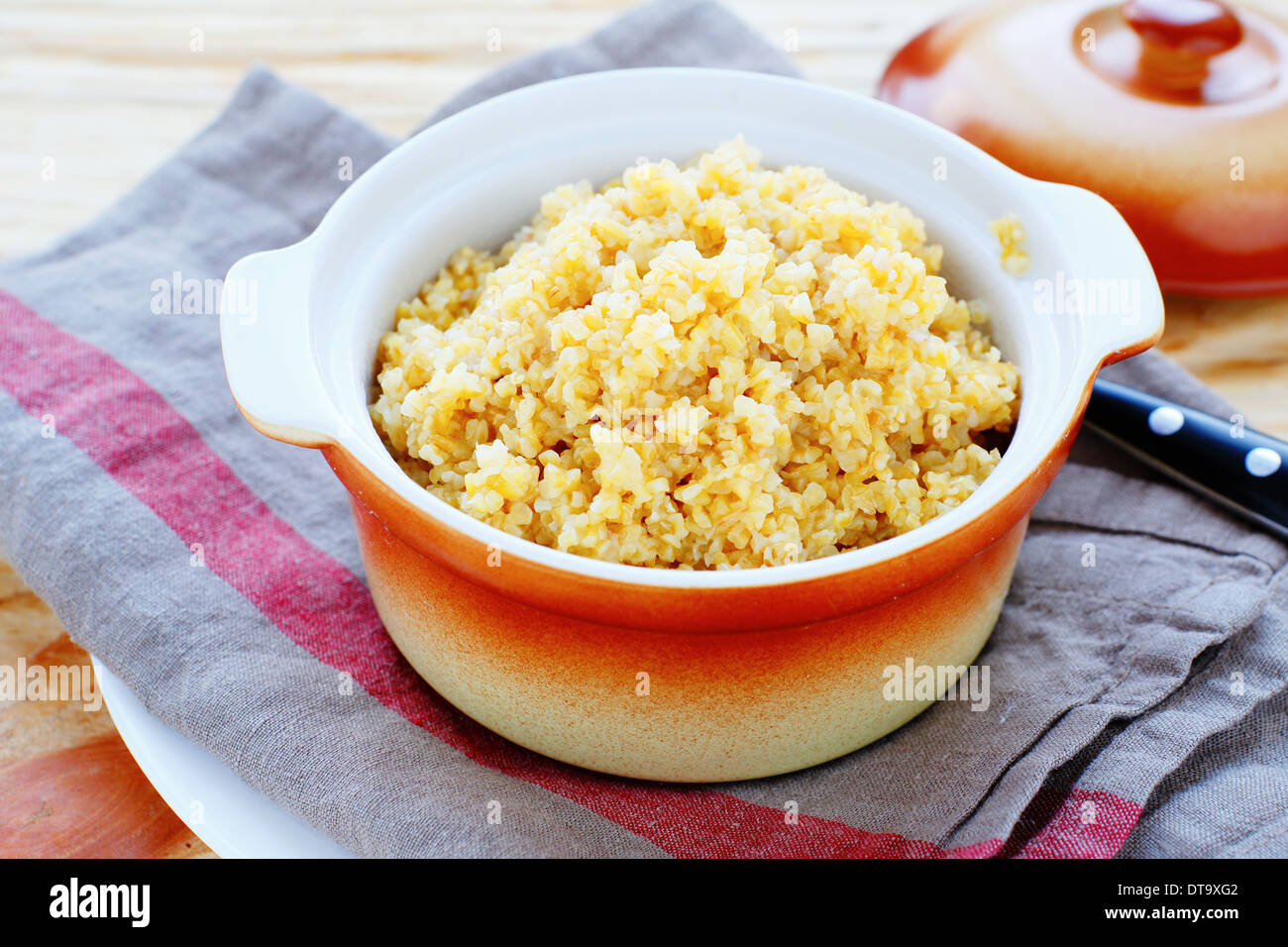 yellow wheat porridge in a pot, food closeup Stock Photo - Alamy