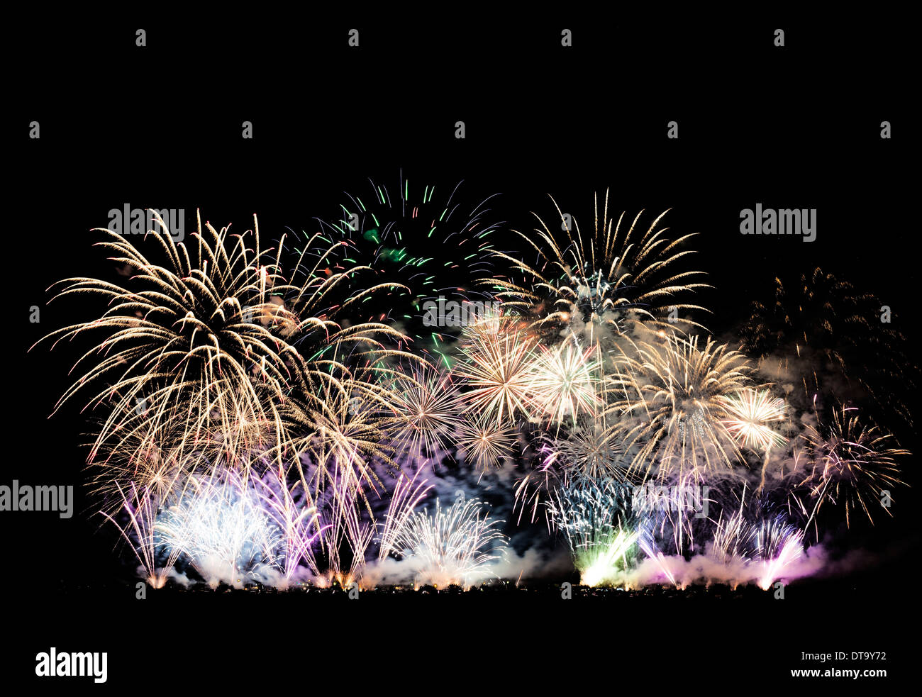 Colorful fireworks over night sky Stock Photo - Alamy