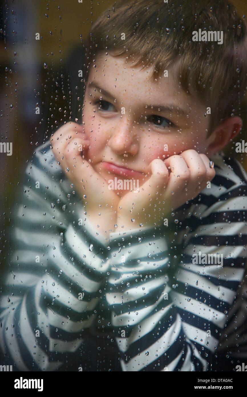 Leaning on the chin with both hands hi-res stock photography and images ...