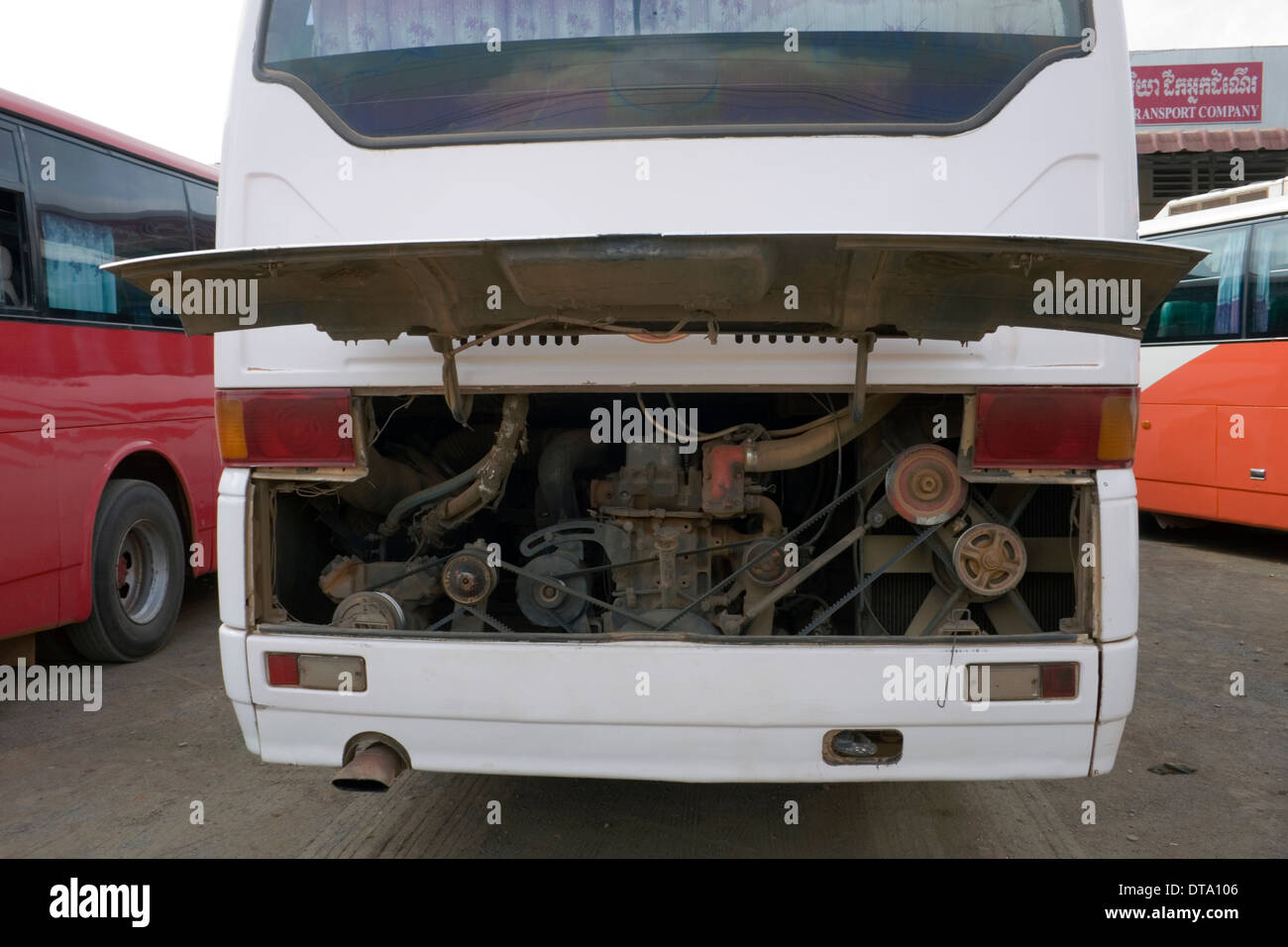 A bus engine is cooling at a rest stop in Kampong Cham Province ...