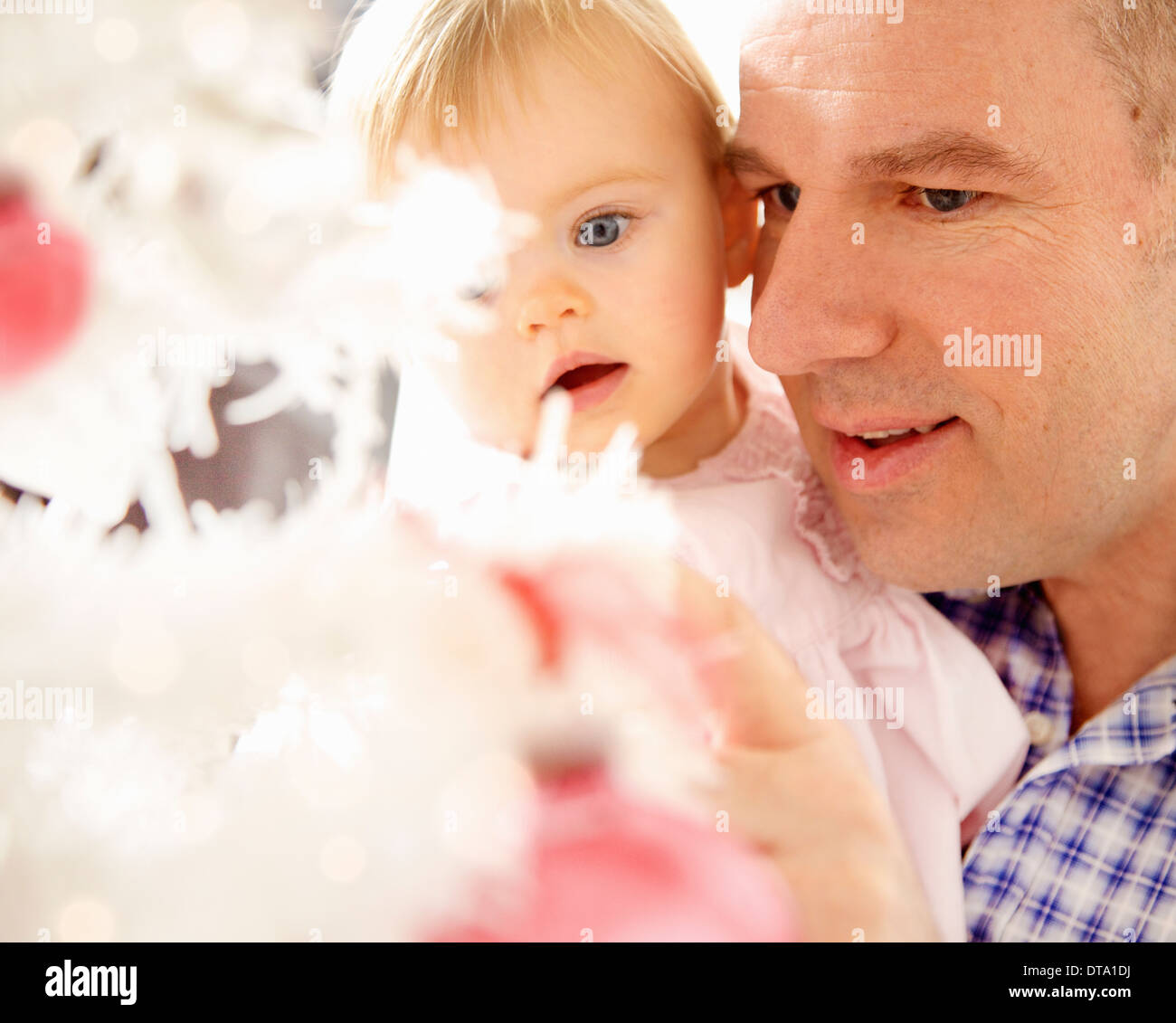 Baby christmas tree daughter family father hi-res stock photography and ...