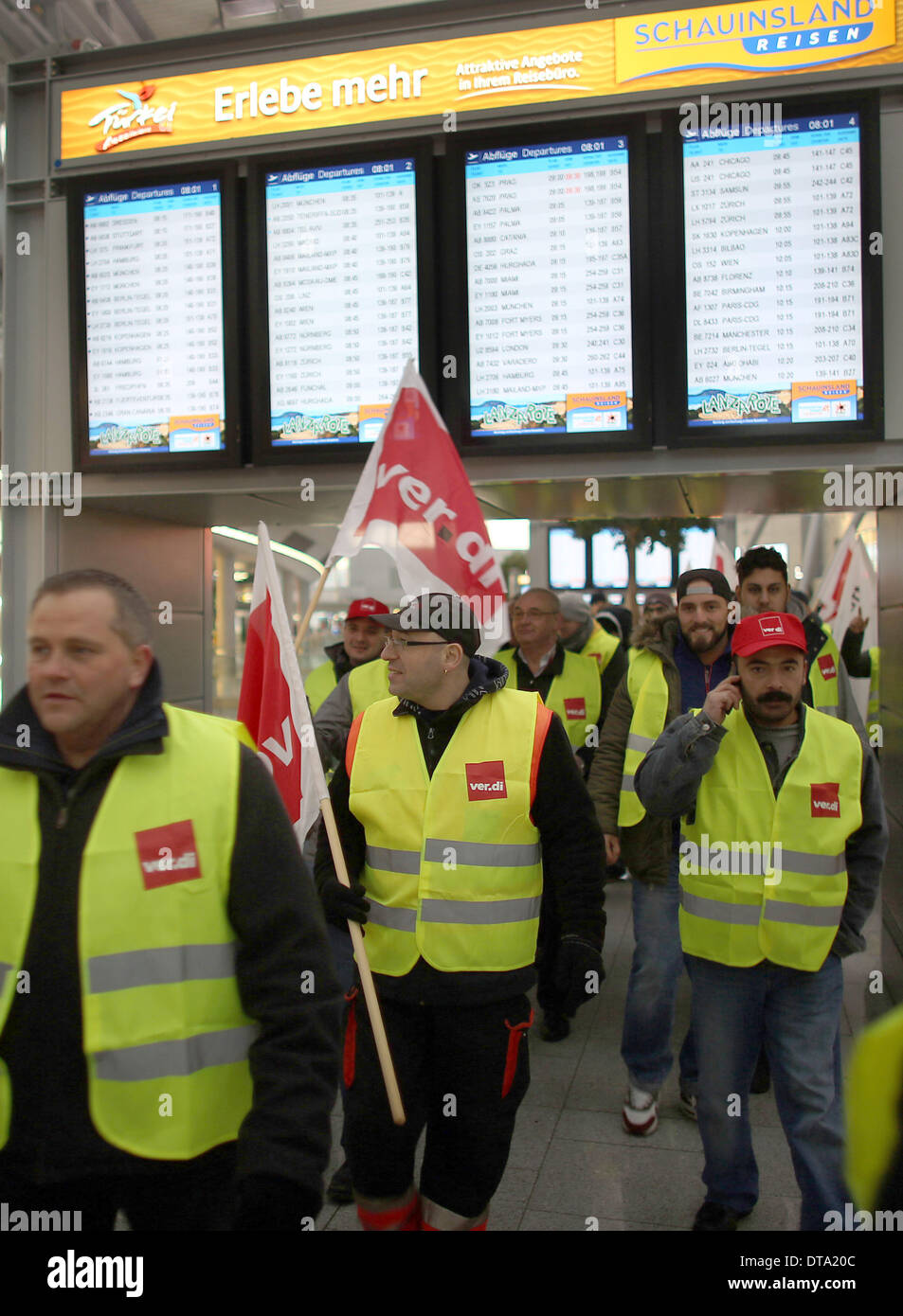 Duesseldorf, Germany. 13th Feb, 2014. Verdi union members walk through ...