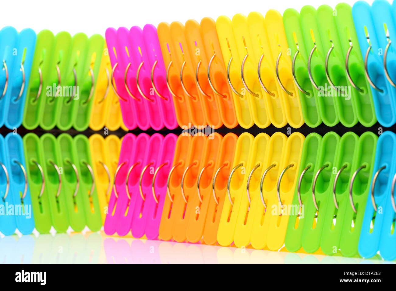 Colorful plastic clothespin on white background Stock Photo - Alamy