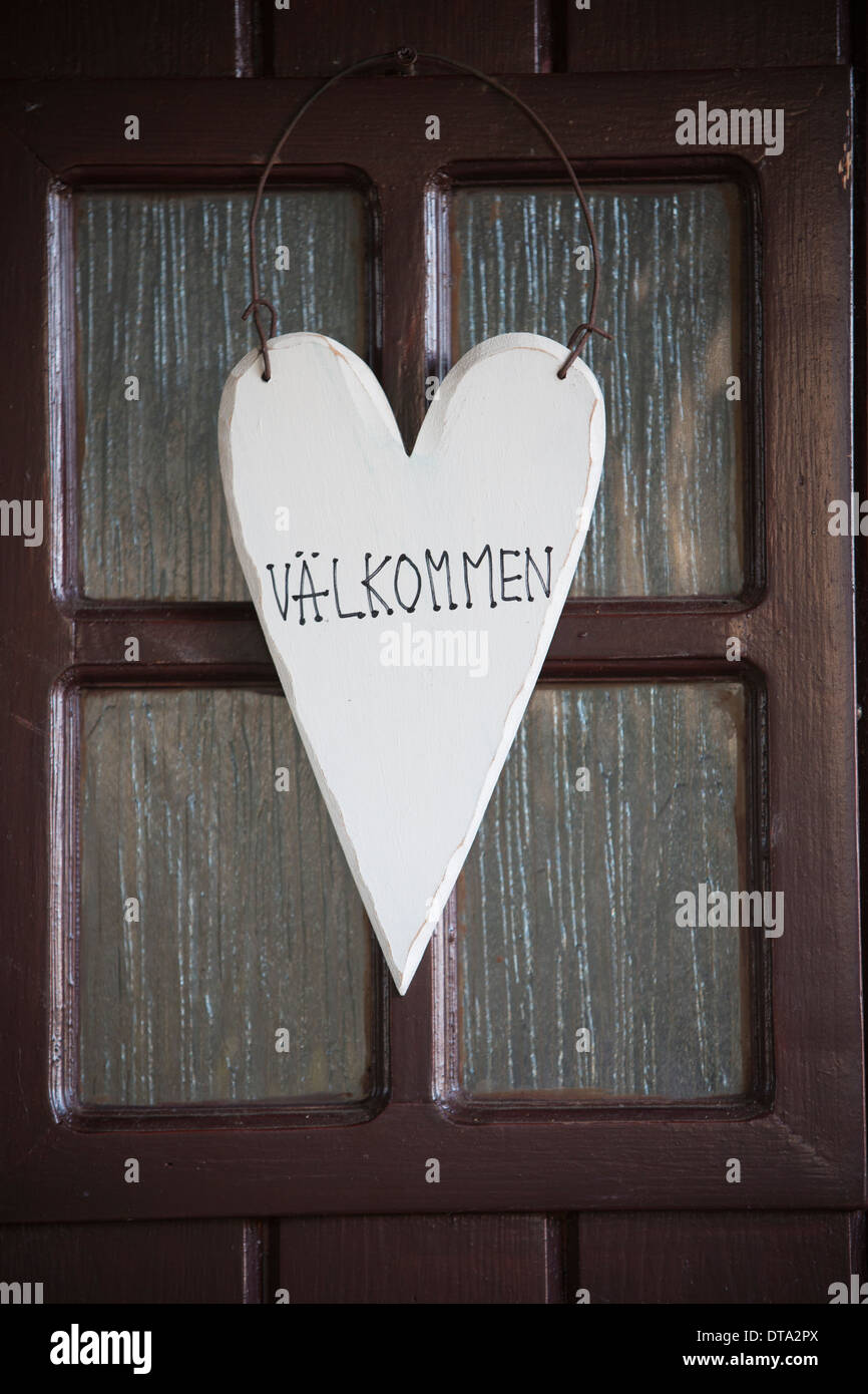 Valkommen, Swedish welcome sign on residential home door, England, UK ...