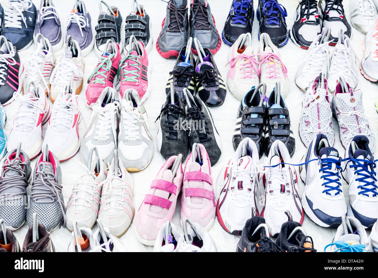 many shoes on white background Stock Photo - Alamy