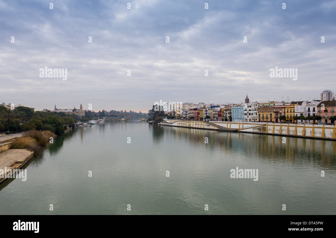 SEVILLE SPAIN THE GUADALQUIVIR RIVER AND BOTH BANKS LOOKING TOWARDS A ...