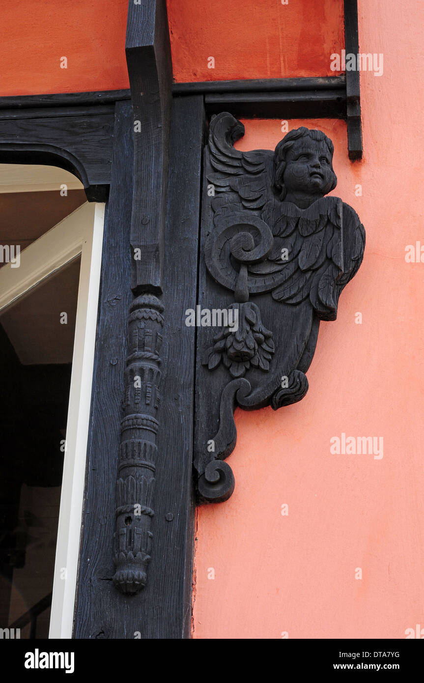 Decorative carving on the window frame of a timberframed building Stock ...