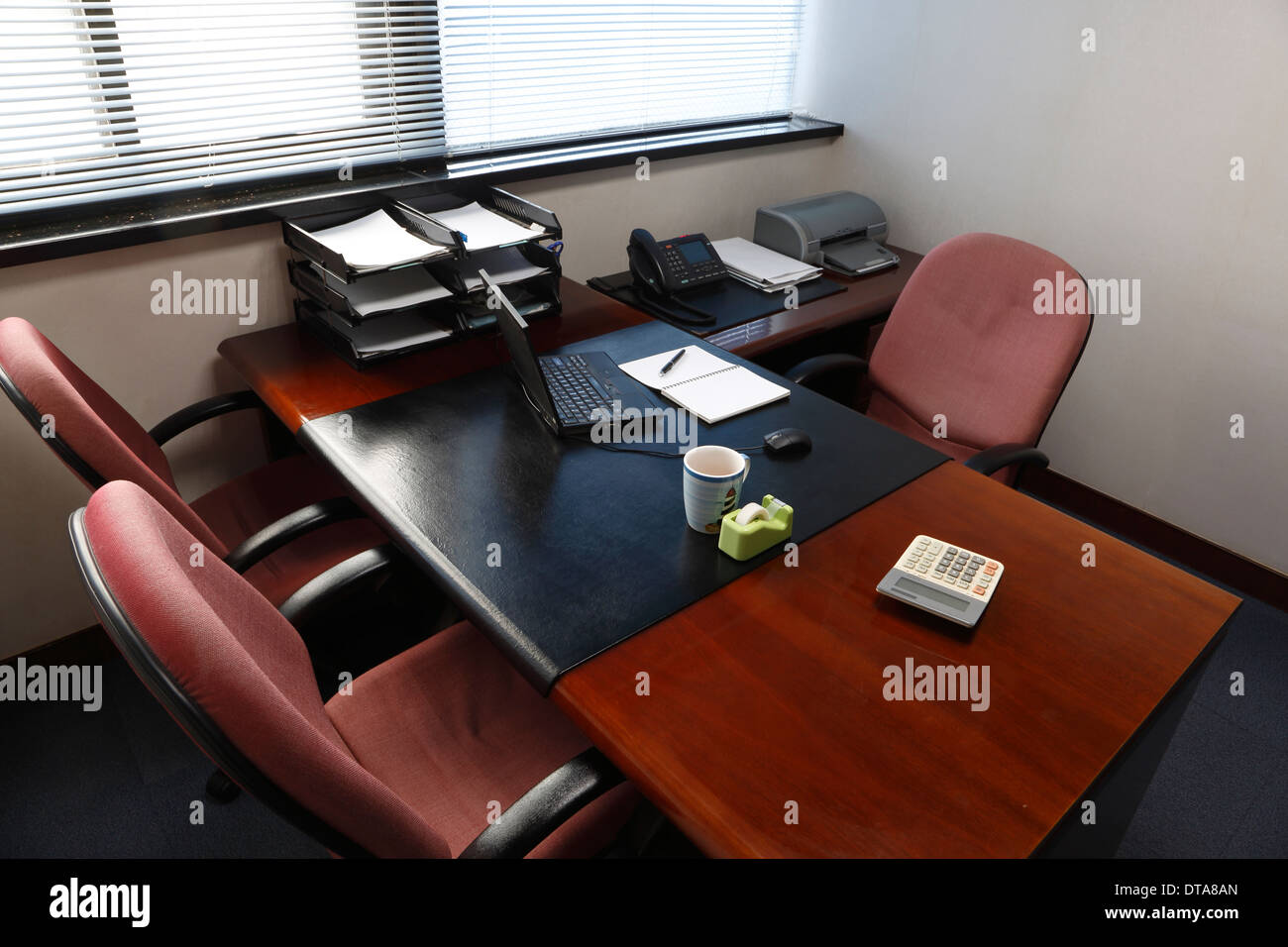 Empty modern office with laptop computer Stock Photo - Alamy