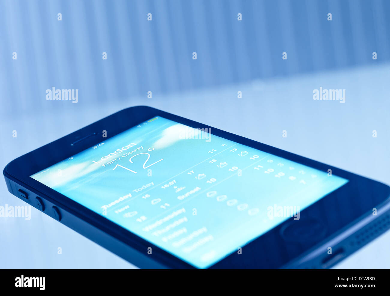 iPhone with weather forecast Stock Photo - Alamy