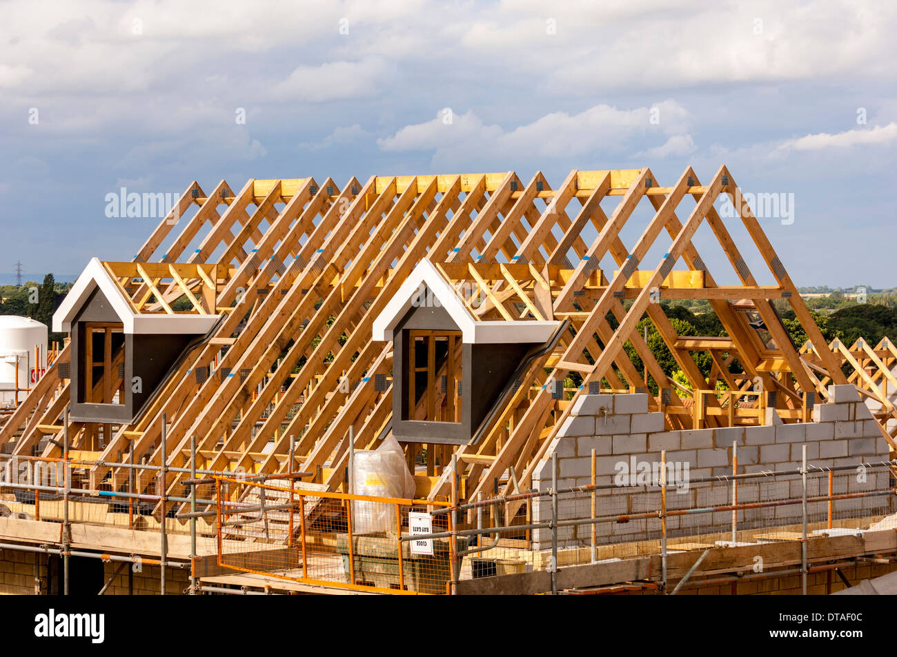 Roof construction on building site Stock Photo - Alamy