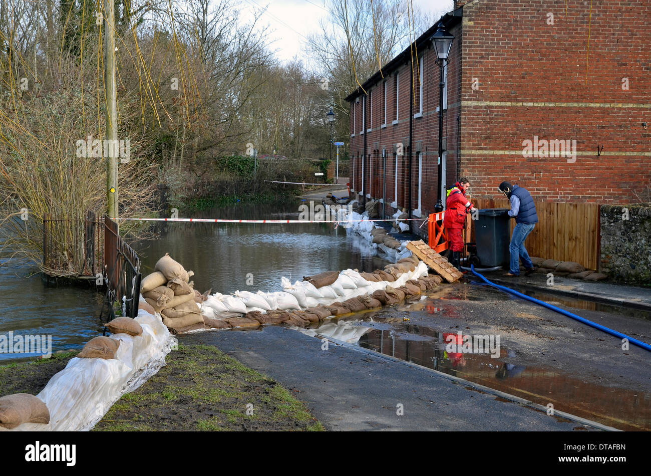 The River Itchen overflows along Water Lane close to the city centre of ...