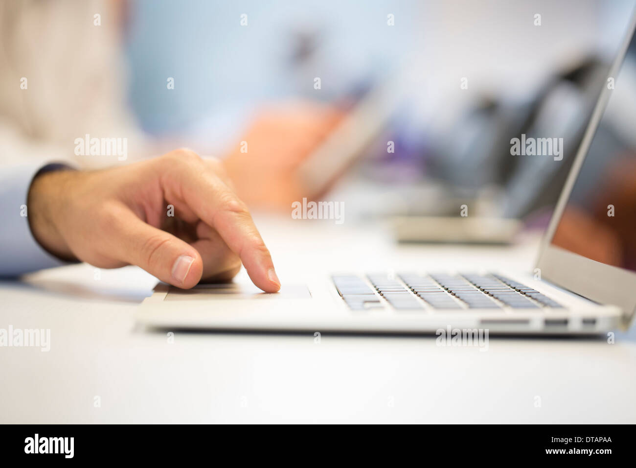 Male finger business man computer desk Stock Photo - Alamy