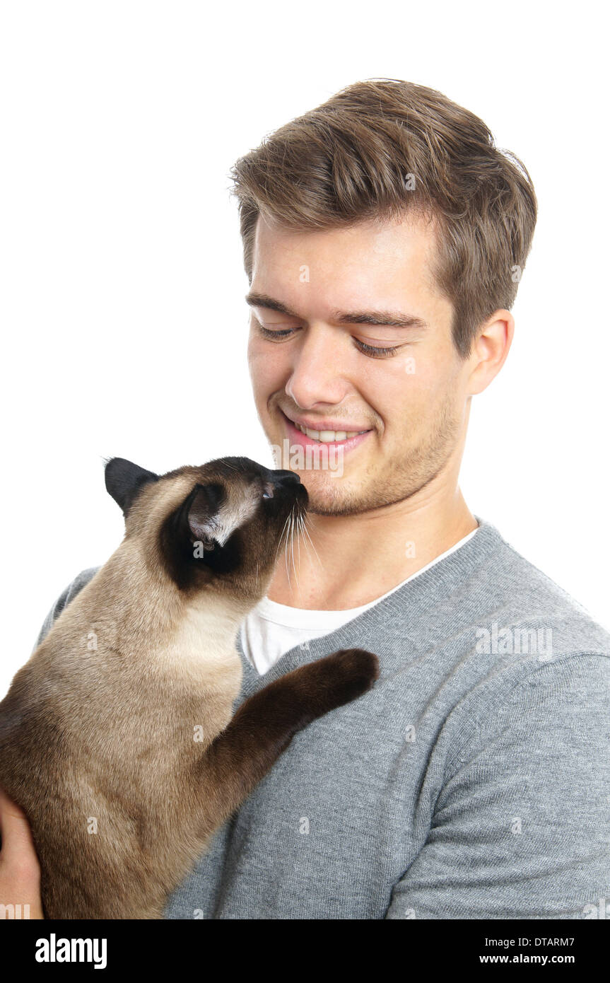 young holding siamese cat Stock Photo - Alamy