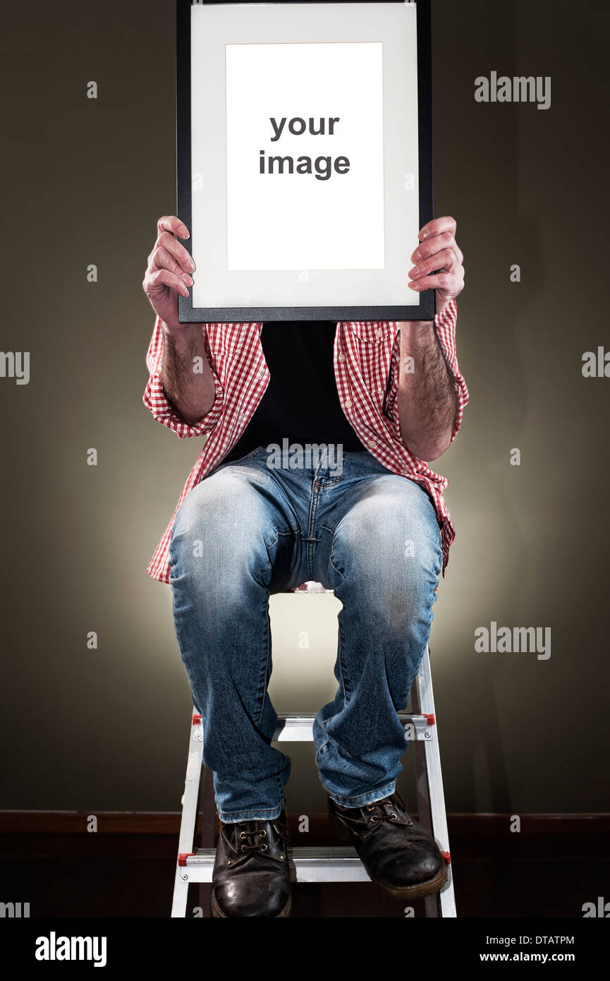 Man holding up picture frame hi-res stock photography and images - Alamy