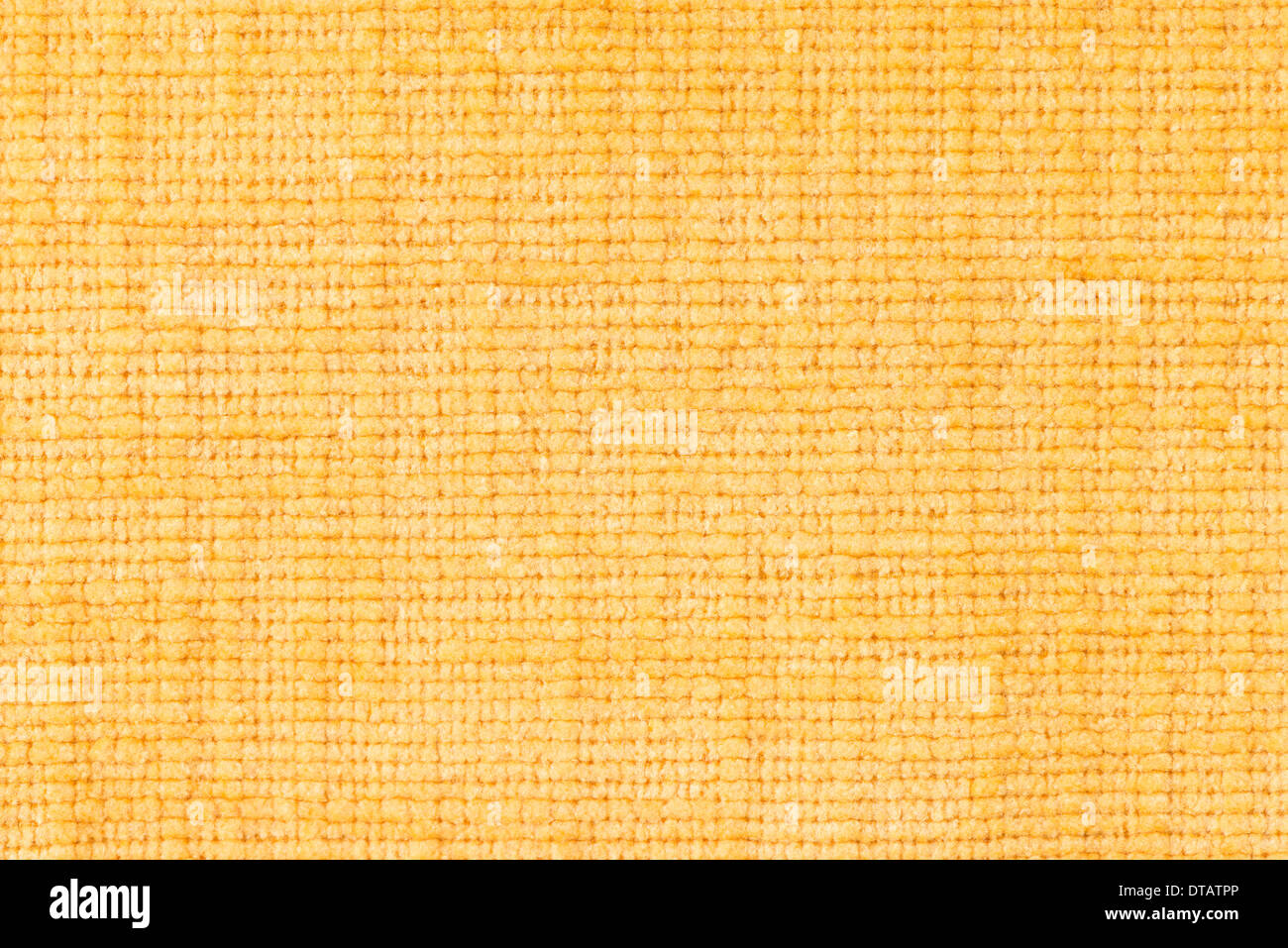 Closeup detail of yellow fabric texture background Stock Photo - Alamy