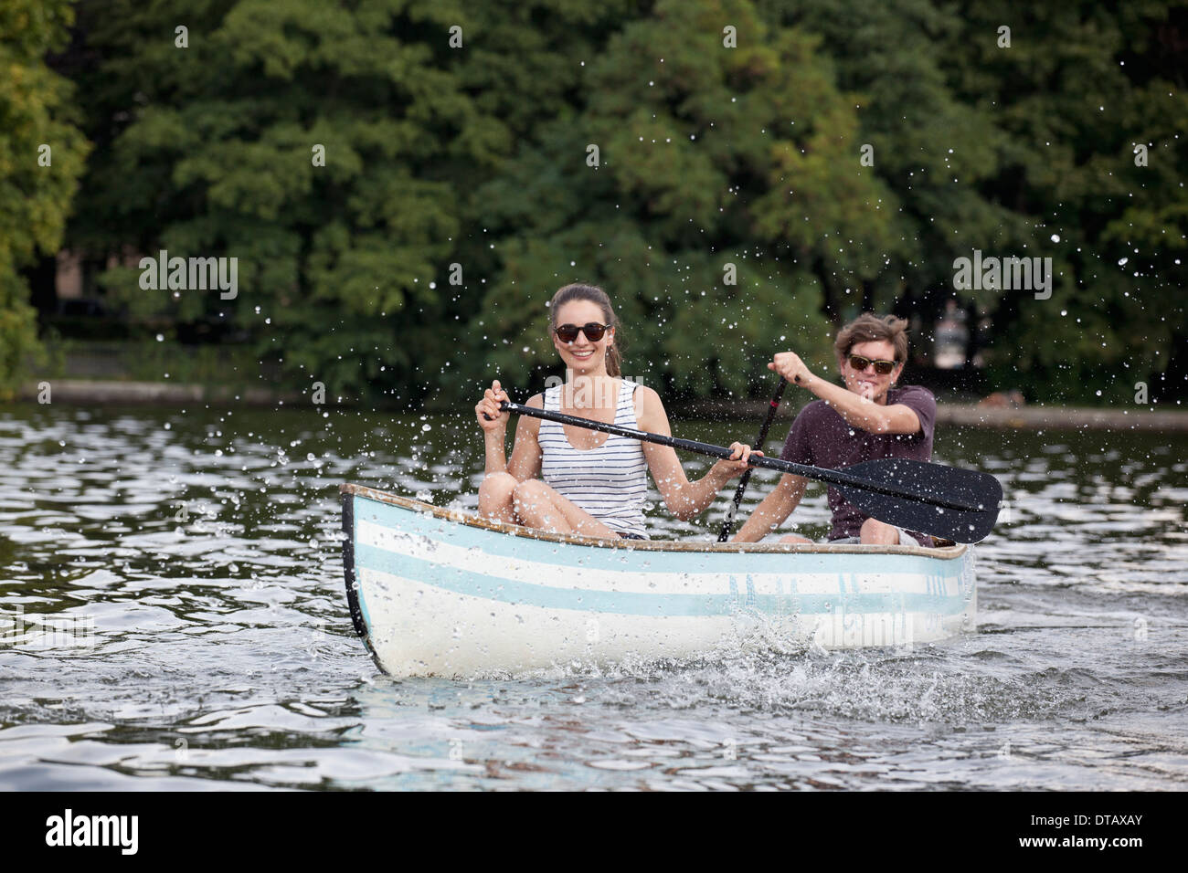 Paddle boat couple on vacations hi-res stock photography and images - Alamy