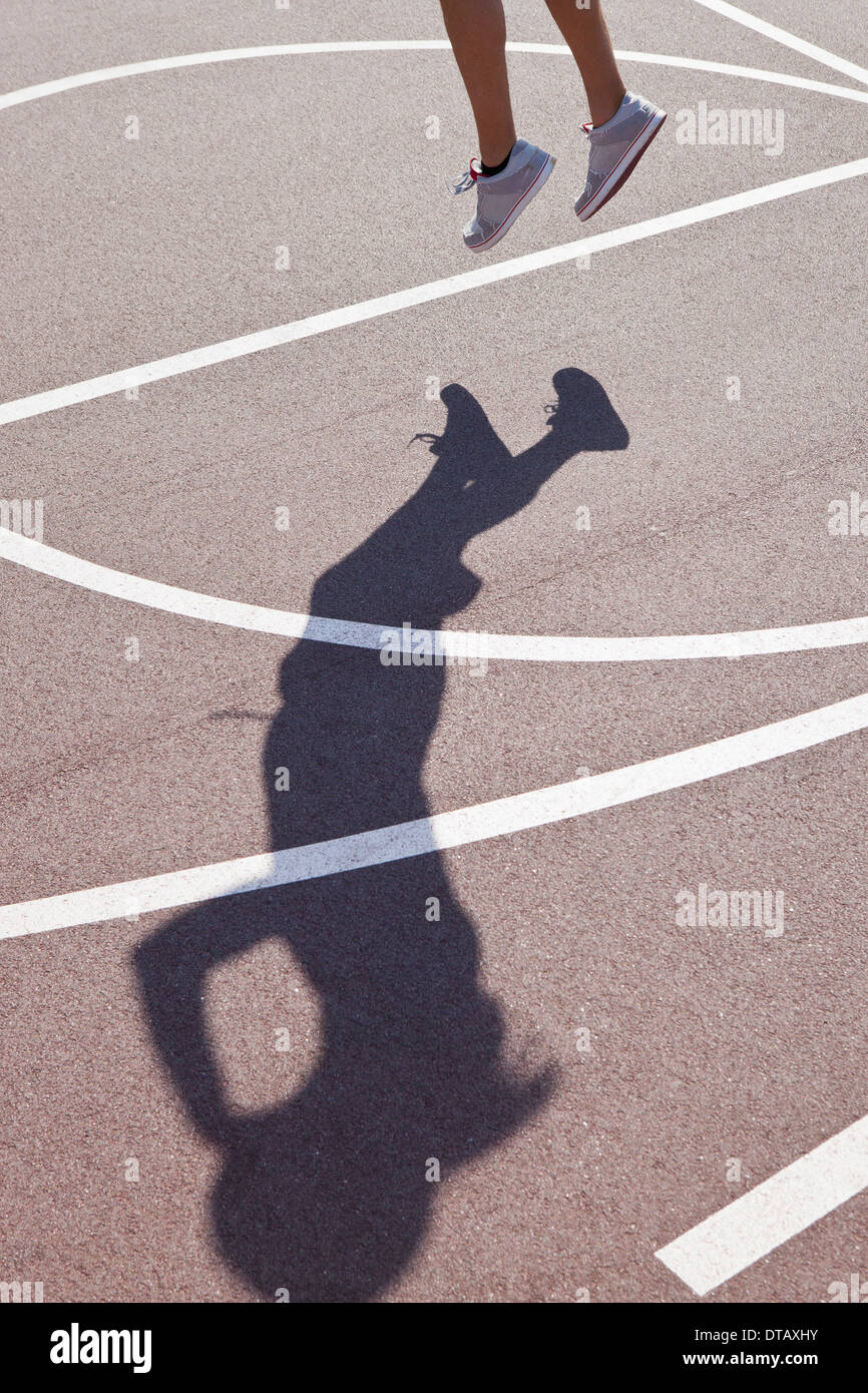 Shadow of man playing basketball Stock Photo - Alamy