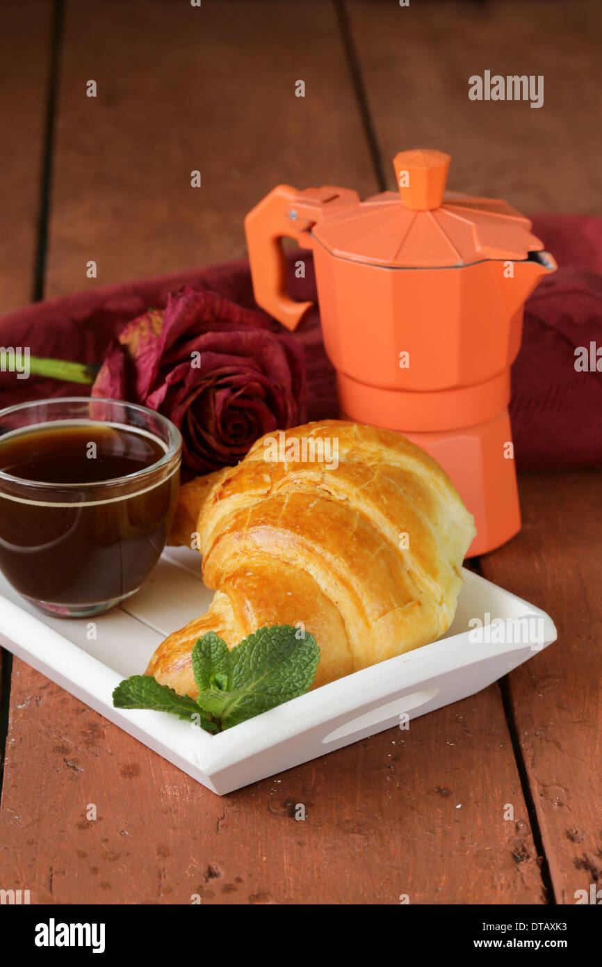 elegant coffee break or breakfast cup of coffee and croissant Stock ...