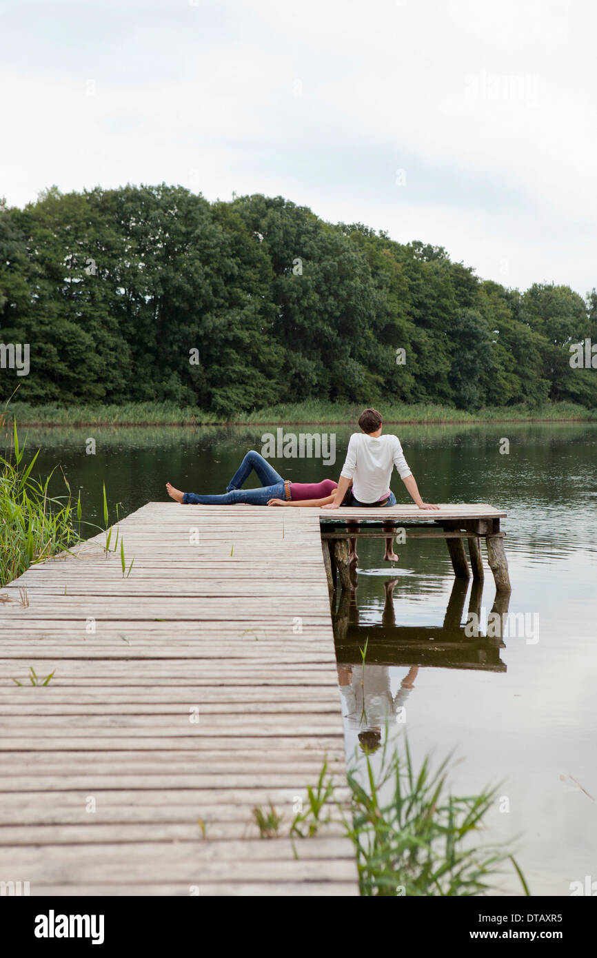 Young people on the pier hi-res stock photography and images - Alamy