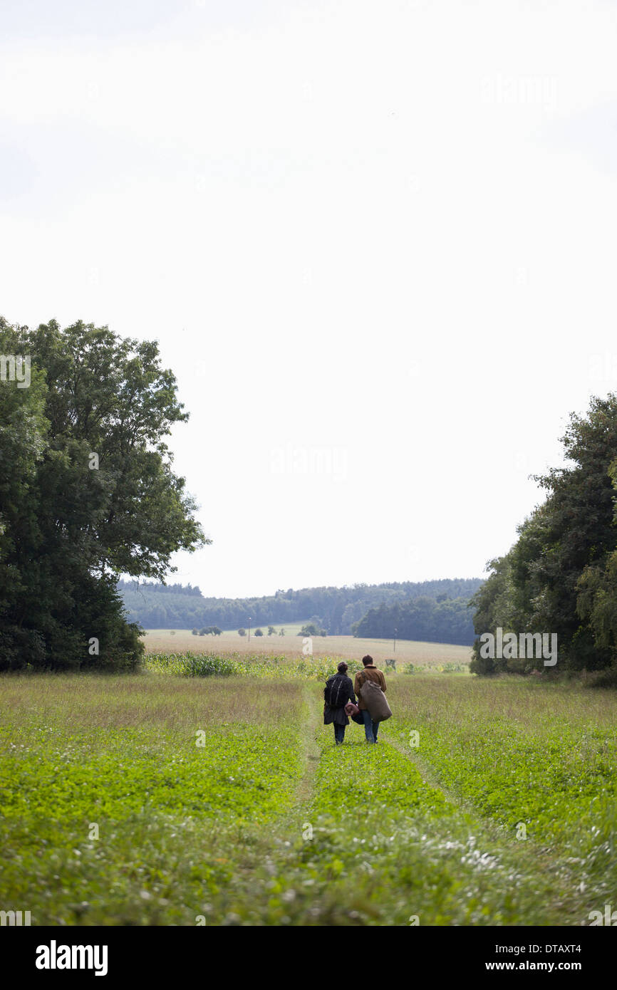 Walking through field hi-res stock photography and images - Alamy