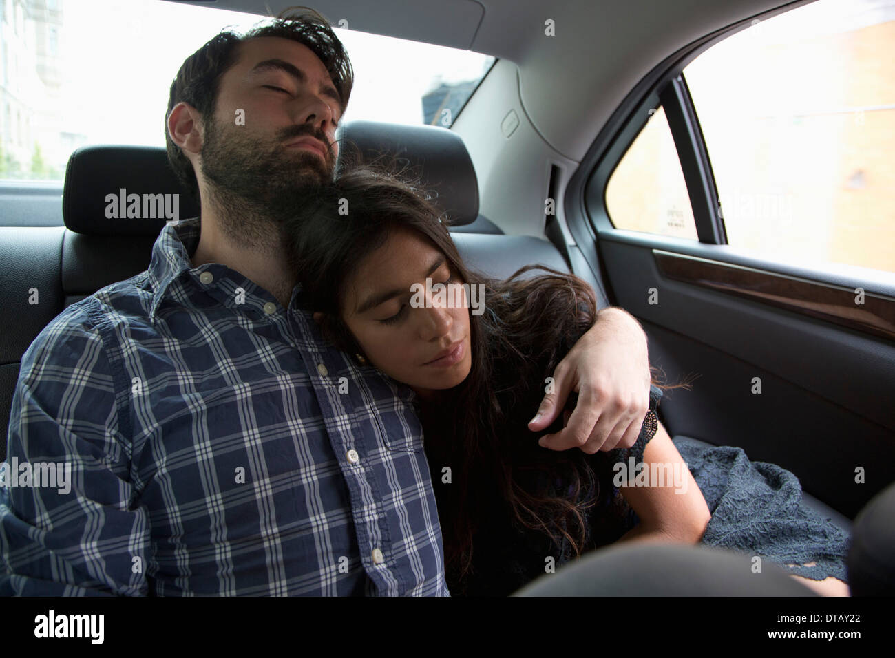 Young couple sitting on car hi-res stock photography and images - Alamy