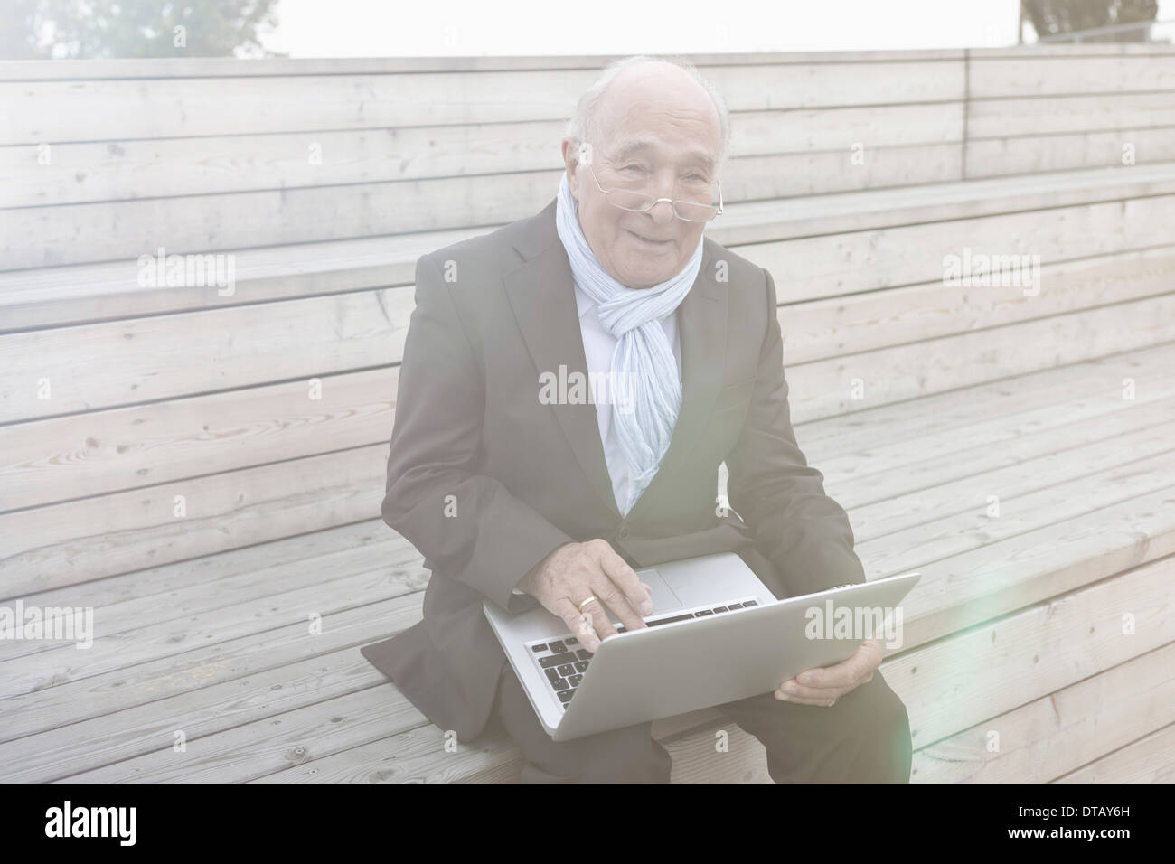 Man holding laptop hi-res stock photography and images - Alamy
