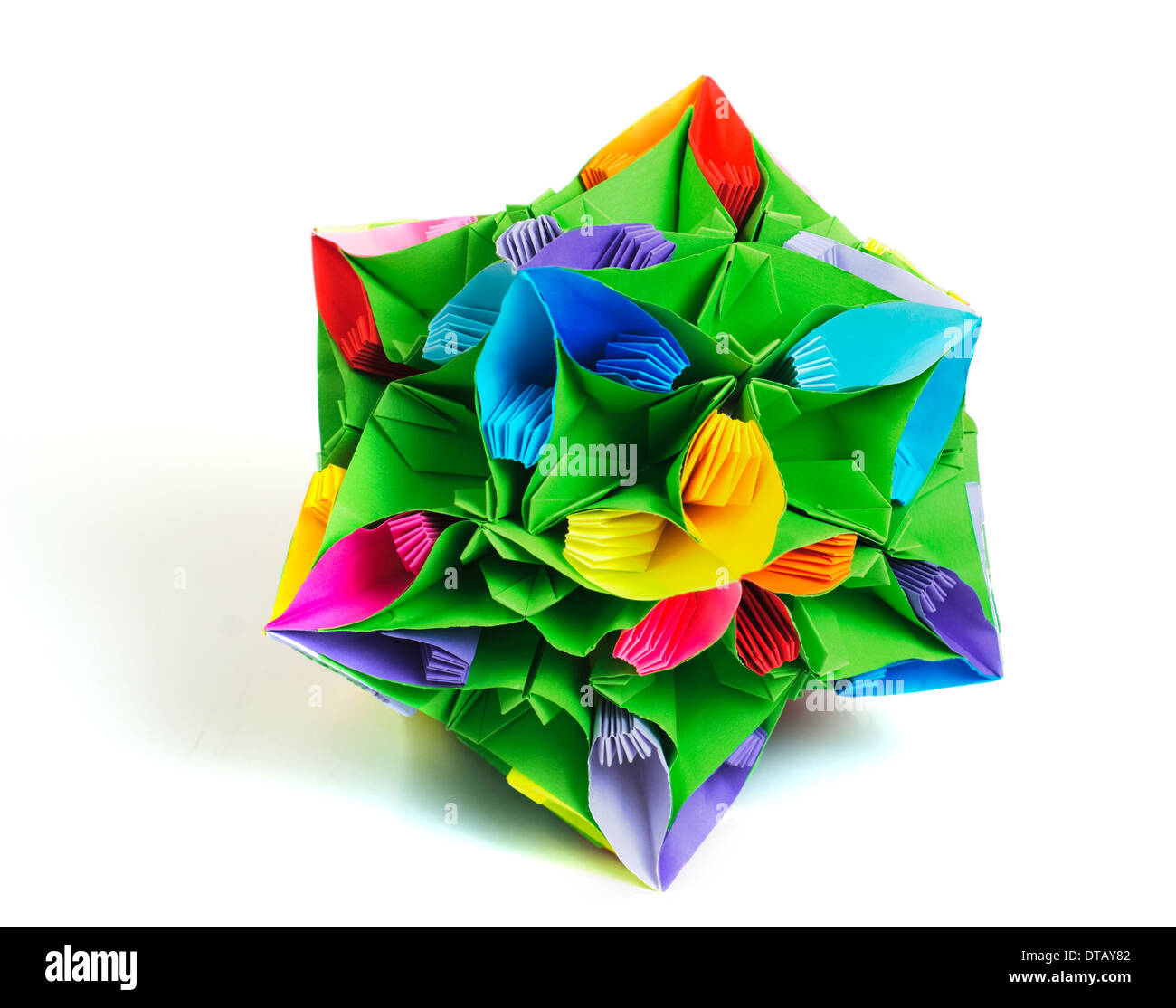 Colorfull origami kusudama from rainbow flowers isolated on white Stock ...