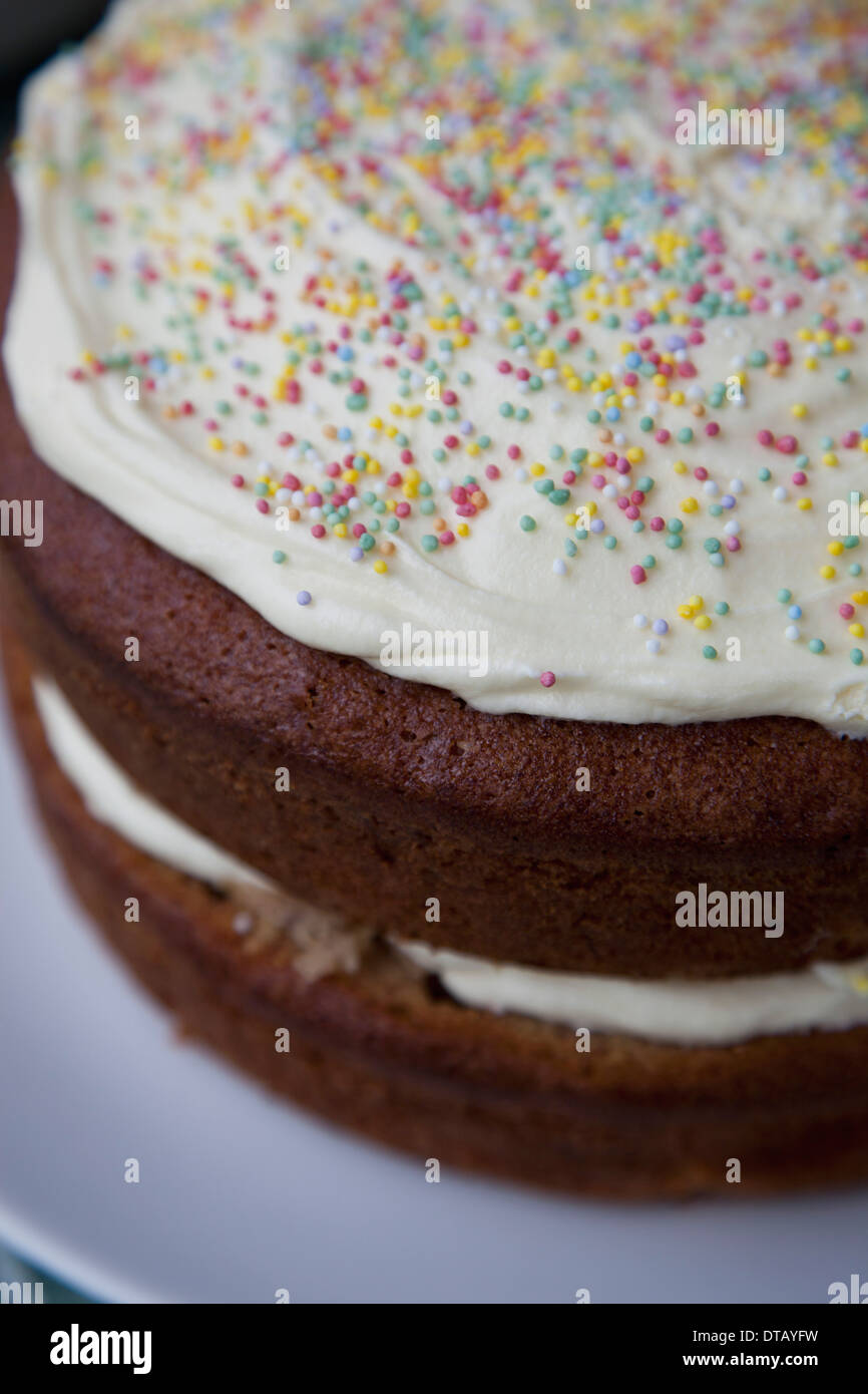 Cake with sprinkles, close-up Stock Photo - Alamy