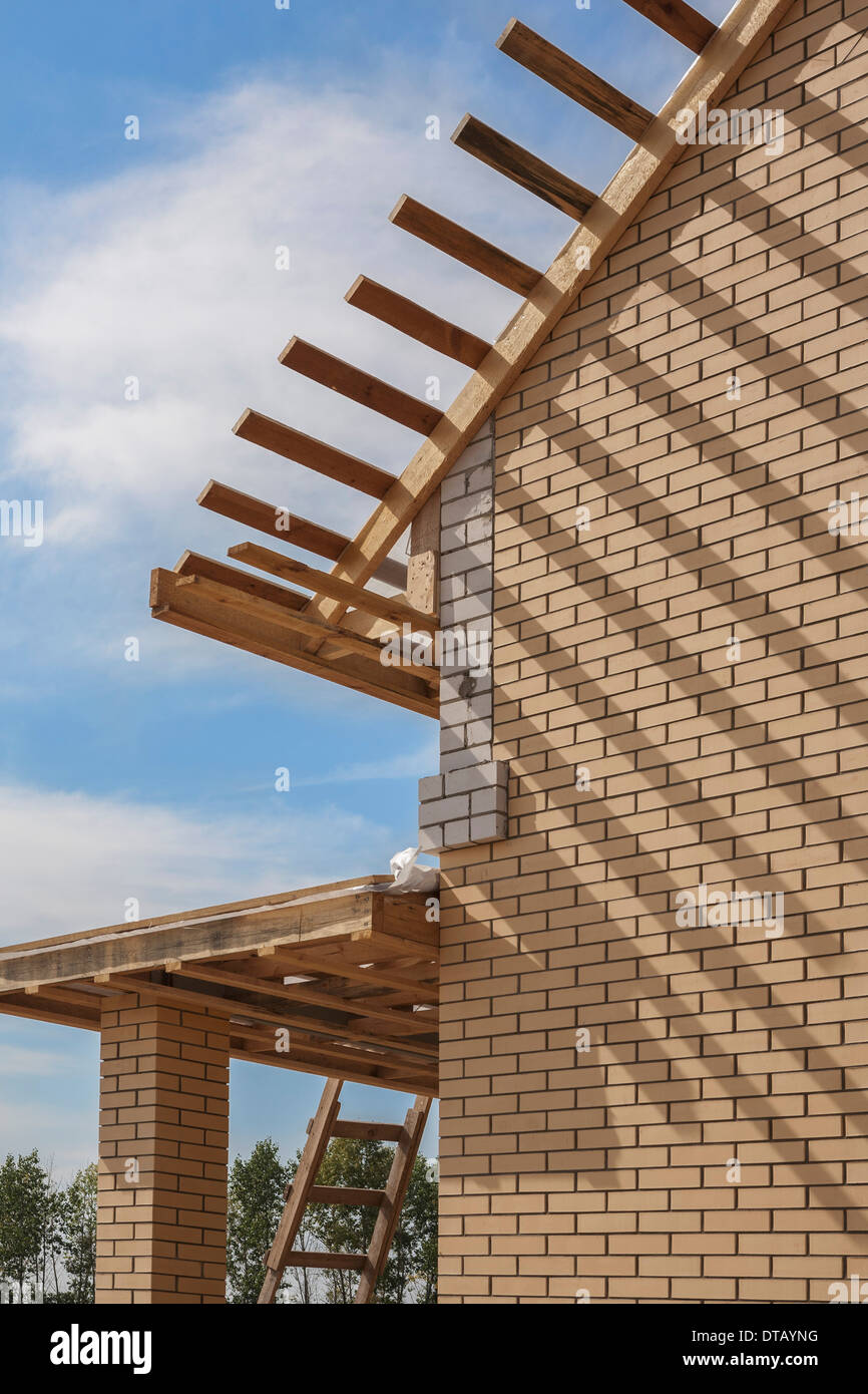House with wooden roof under construction Stock Photo - Alamy