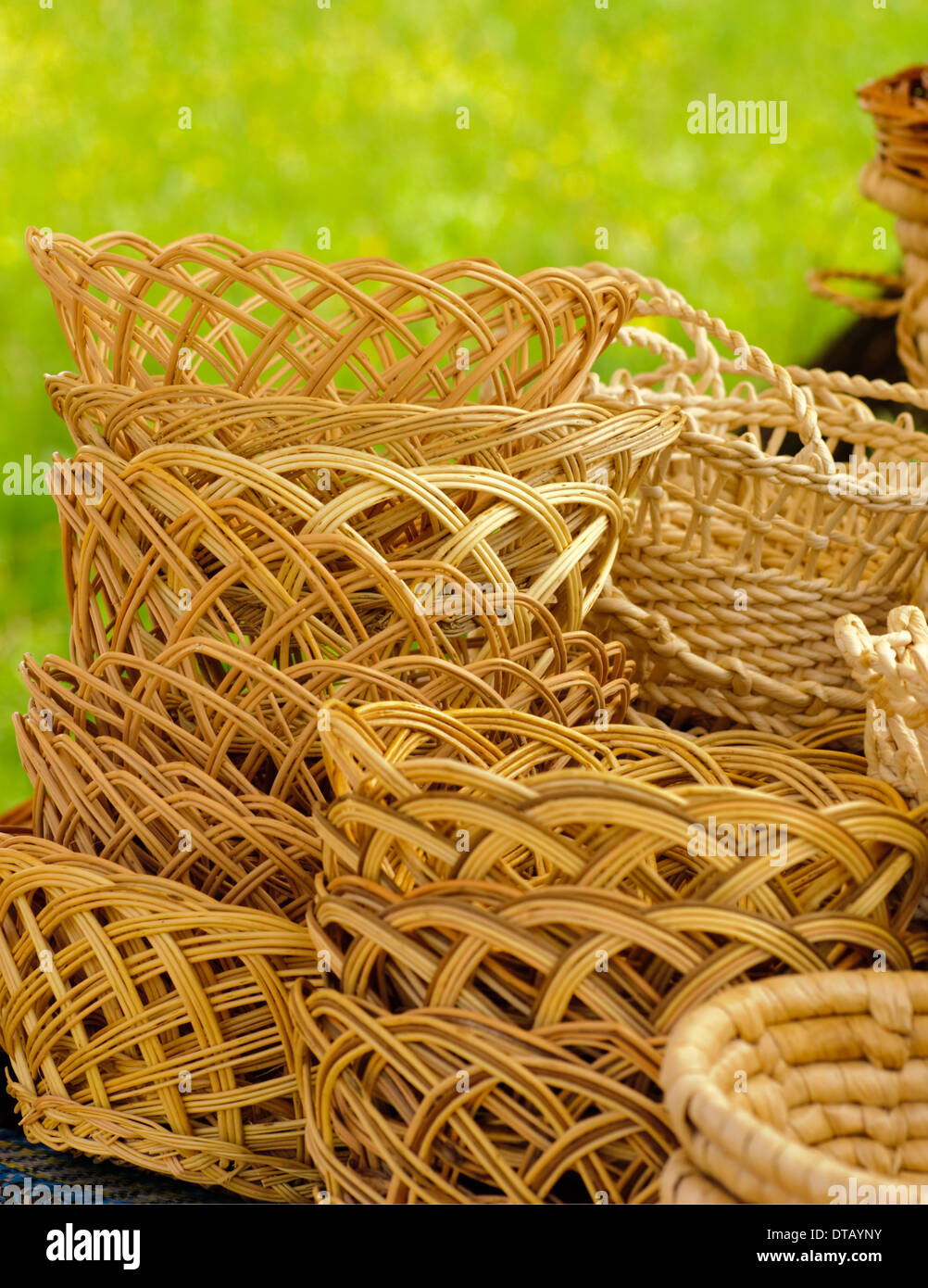 Basketry market on nature. Green field background Stock Photo - Alamy