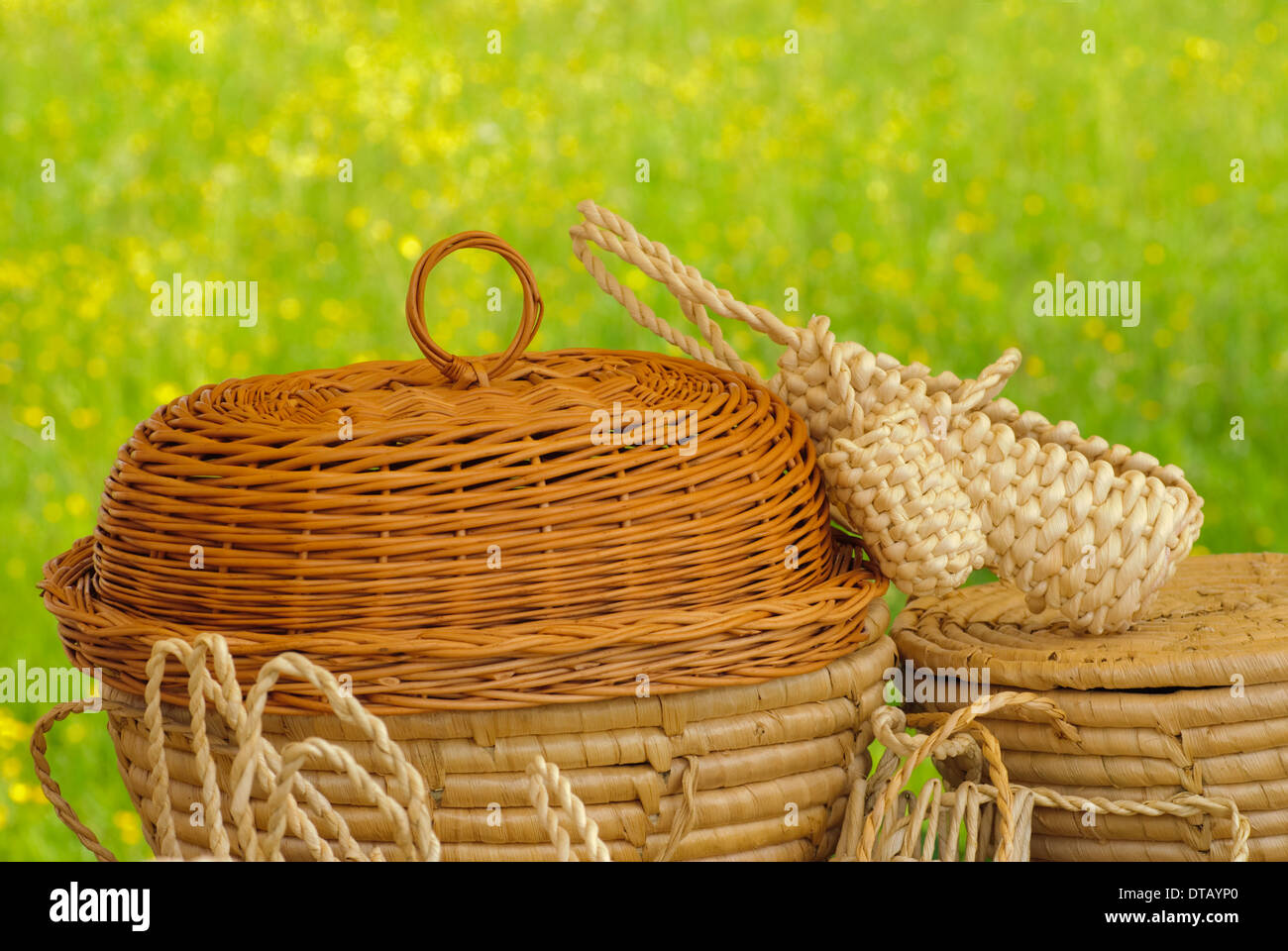 Basketry market on nature. Green field background Stock Photo - Alamy