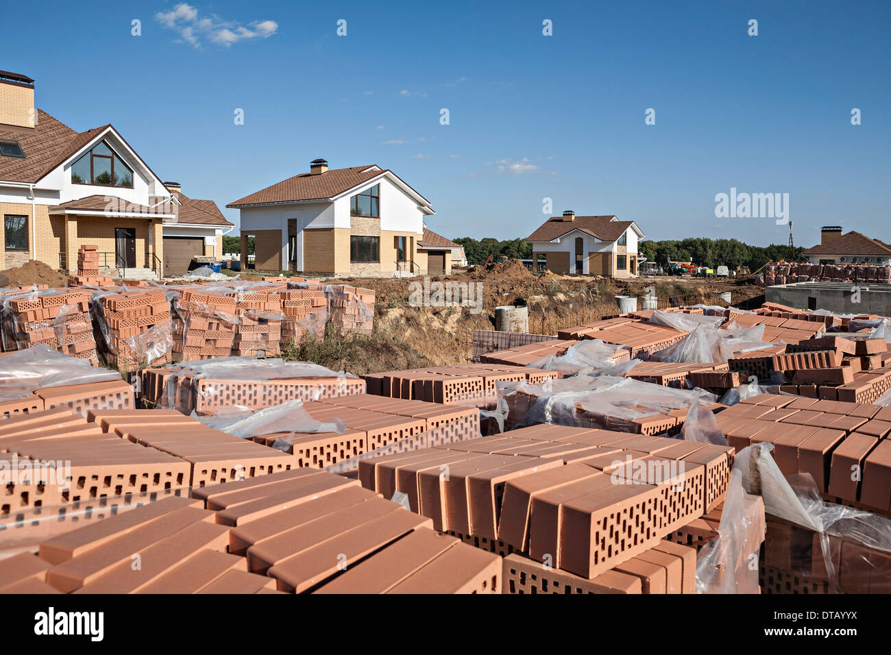 Stacks of hollow bricks at construction site Stock Photo - Alamy