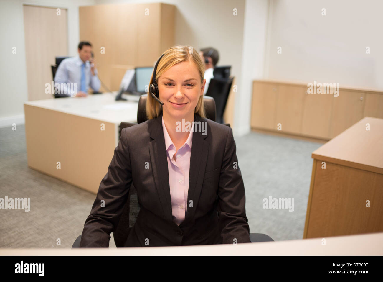 Female hotel receptionist hi-res stock photography and images - Alamy
