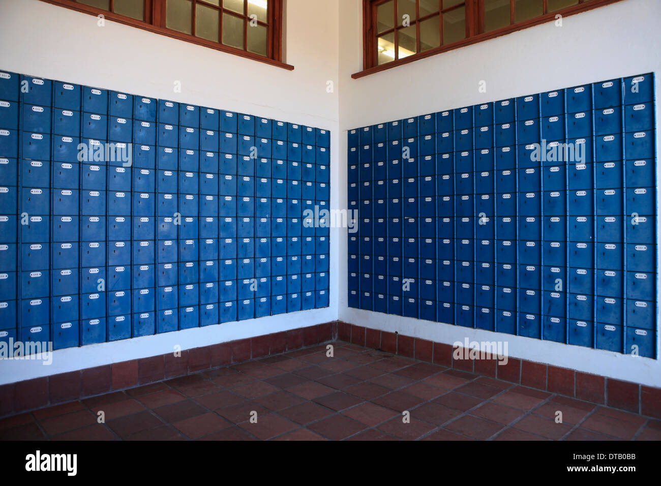 Locker room with blue lockers Stock Photo - Alamy