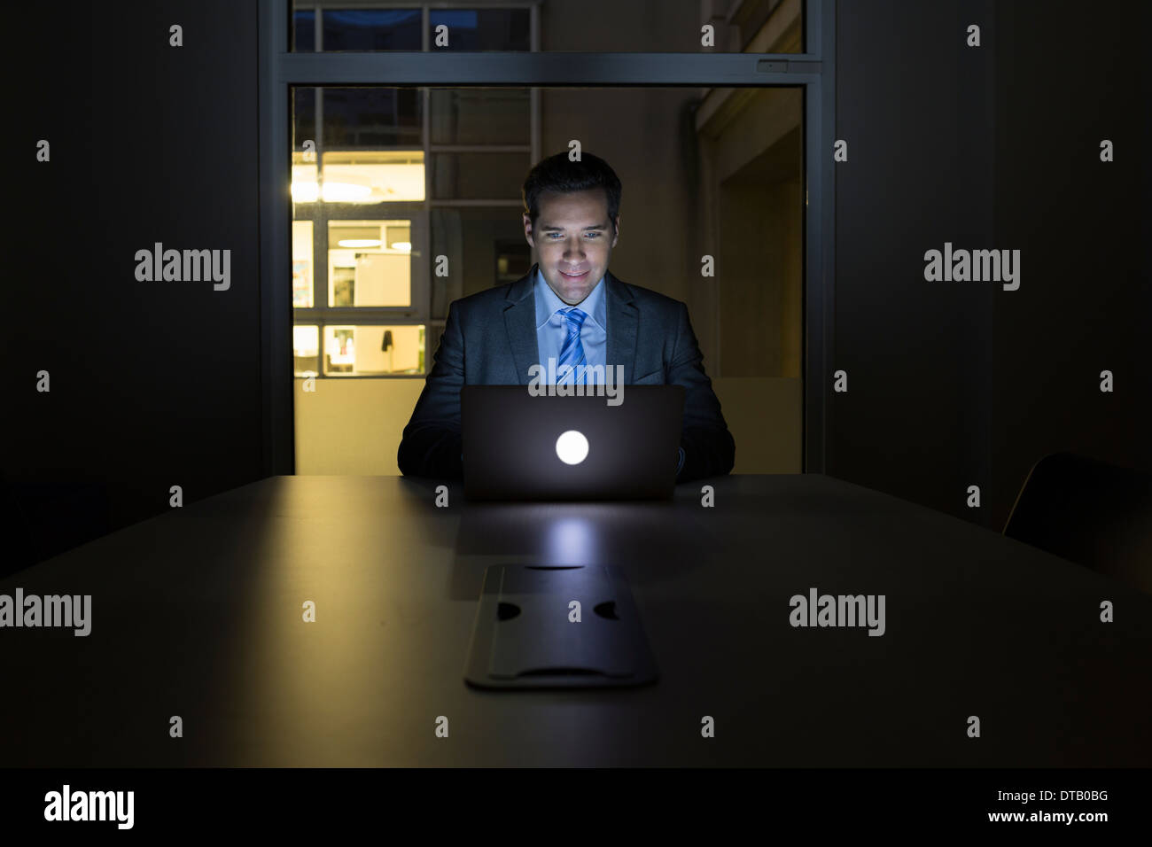 Business man working late dark computer hi-res stock photography and ...