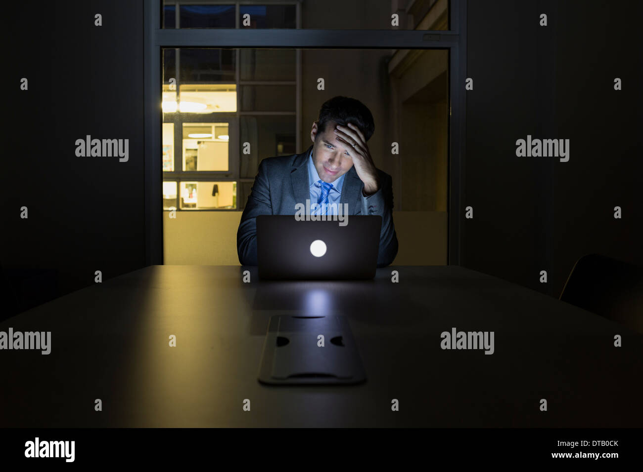 Male working late office desk hi-res stock photography and images - Alamy