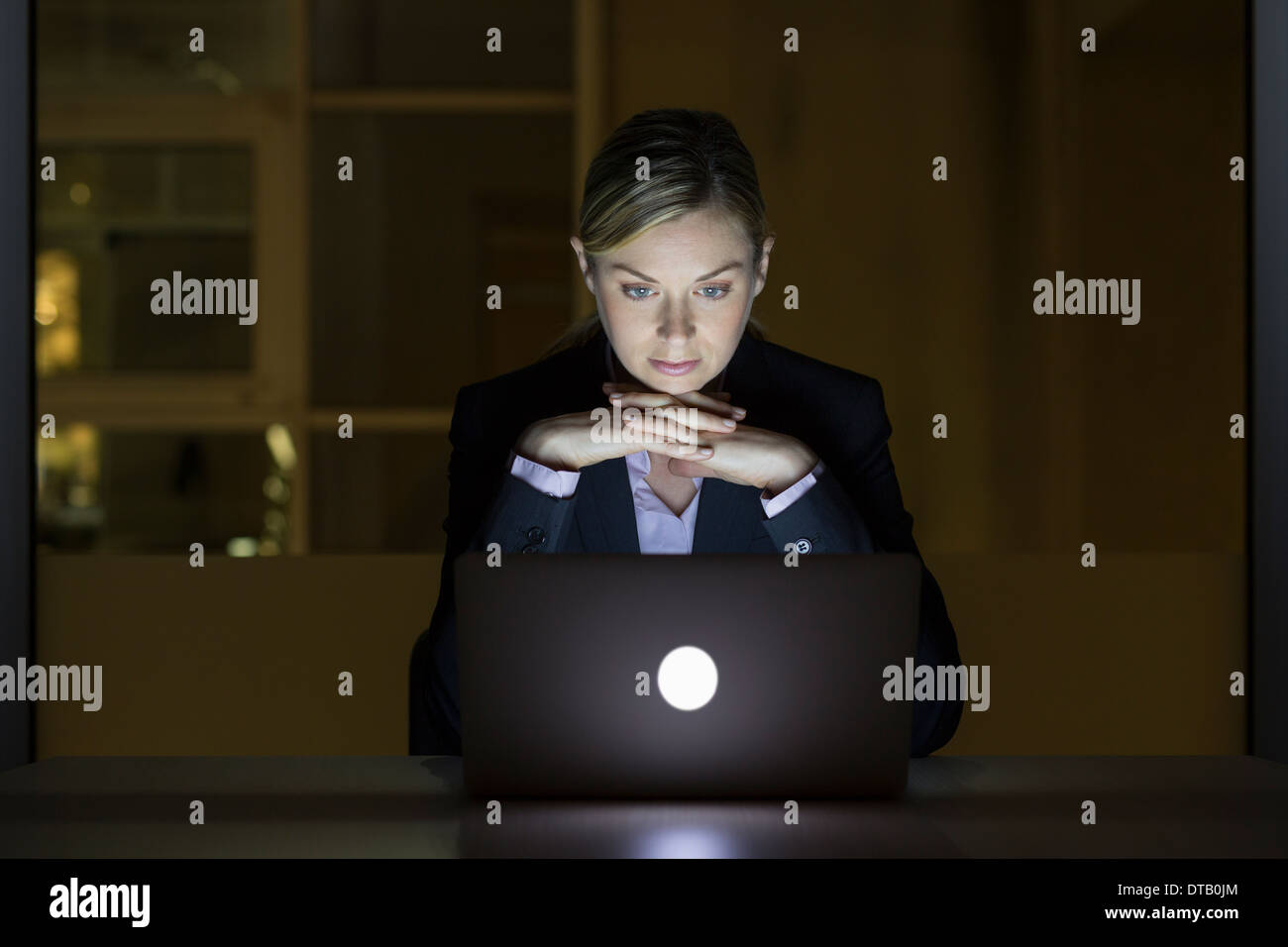 Woman working late on laptop hi-res stock photography and images - Alamy