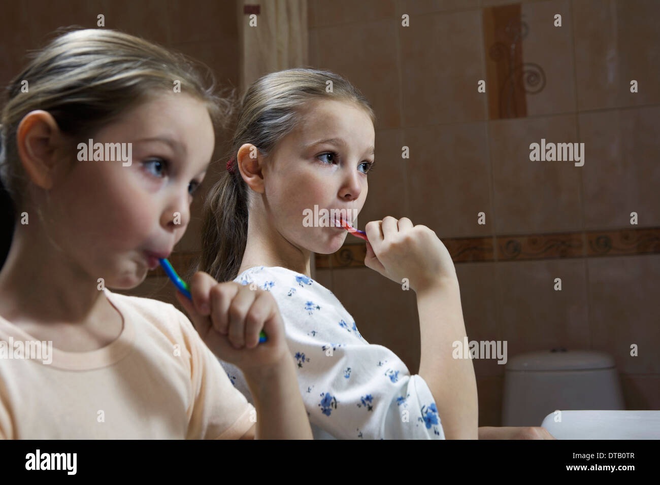 Two girls in bathroom hi-res stock photography and images - Alamy