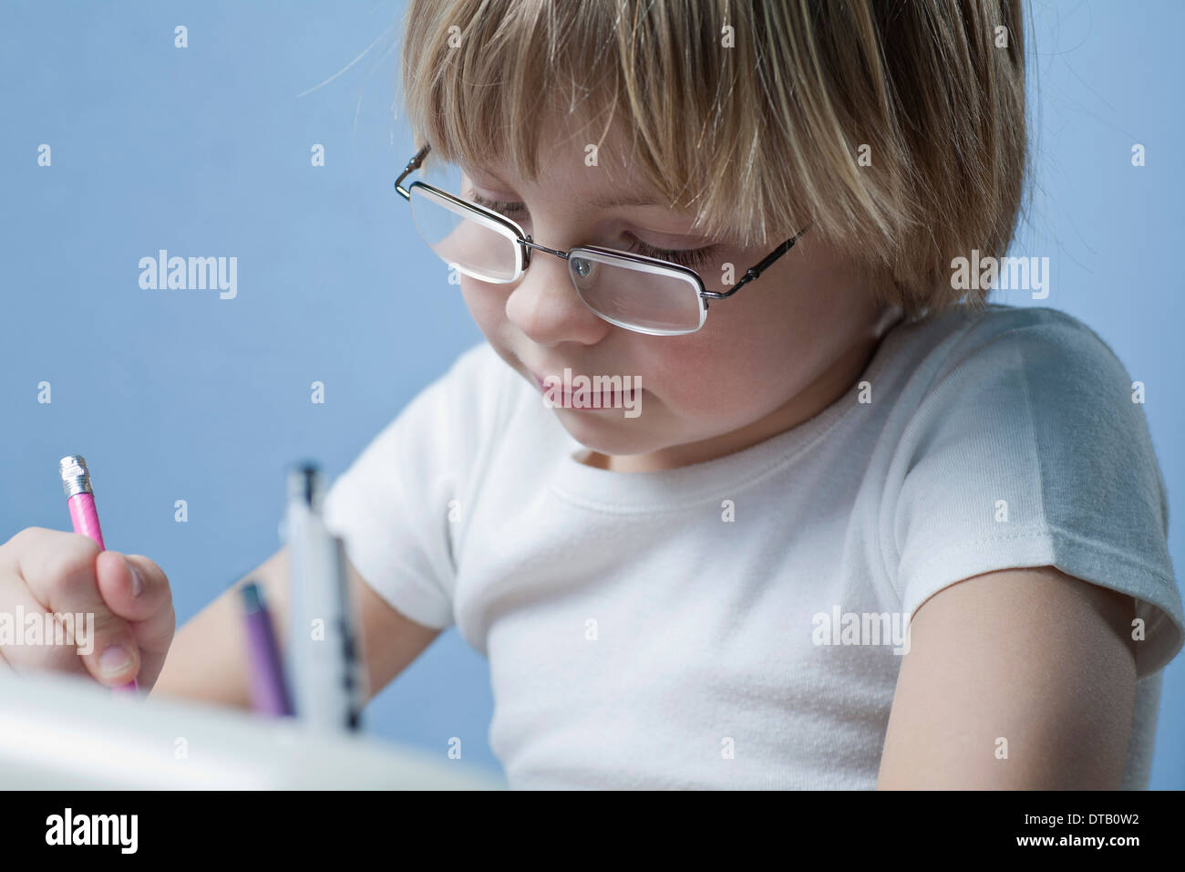 Boy doing homework, close-up Stock Photo - Alamy